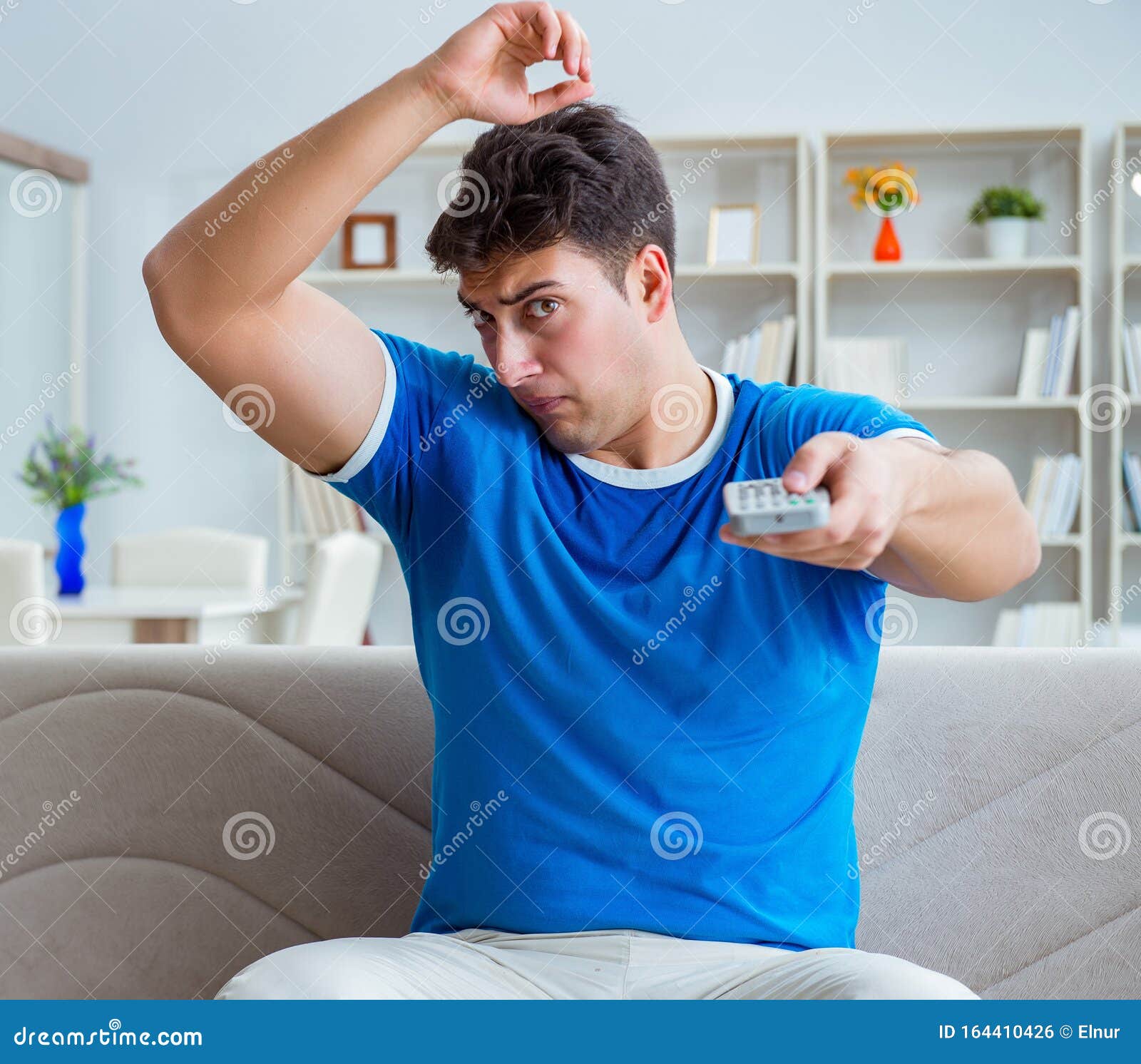 Man Sweating Excessively Smelling Bad at Home Stock Photo - Image of ...