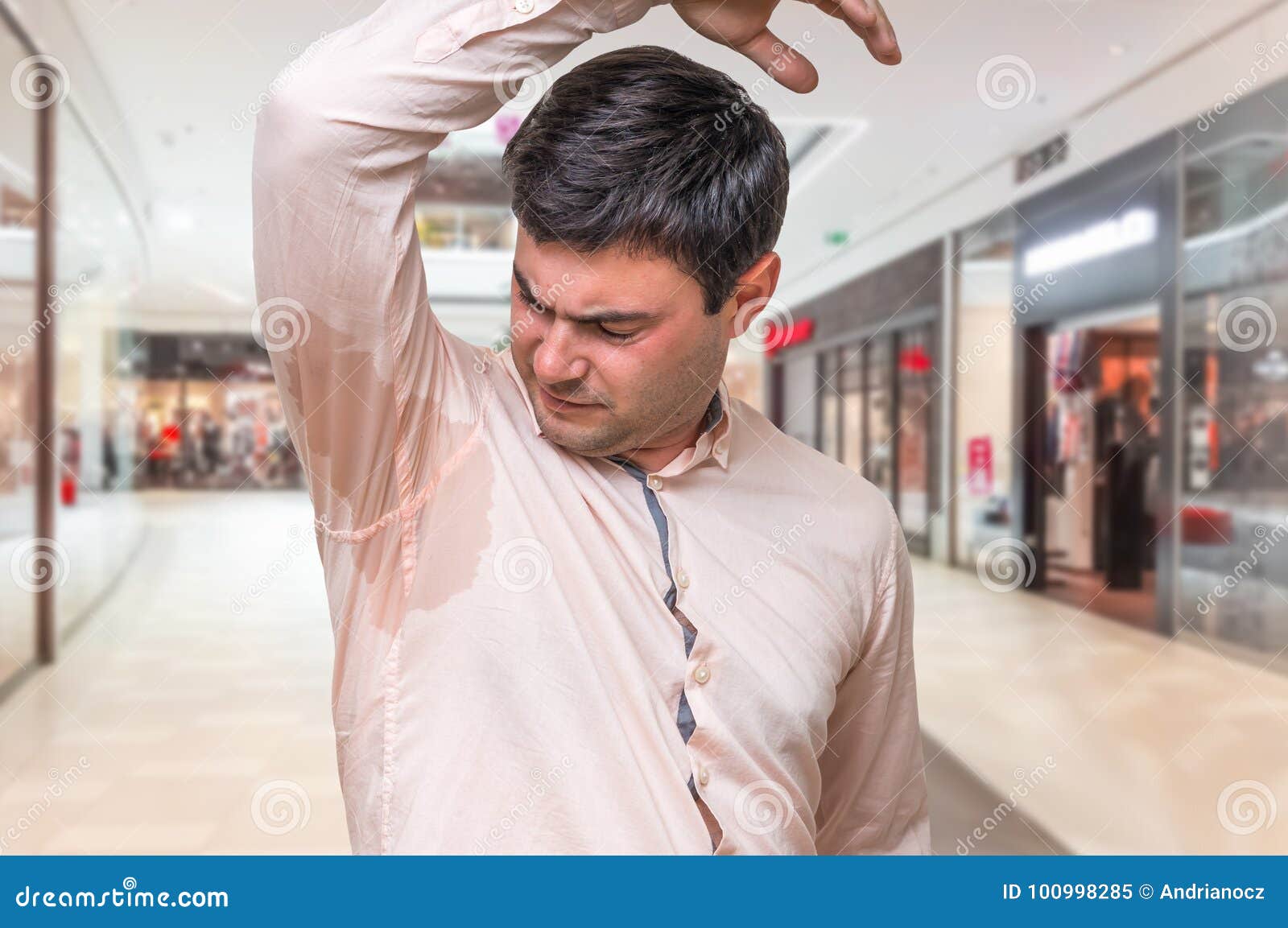 Man with Sweating Under Armpit in Shopping Center Stock Image - Image ...