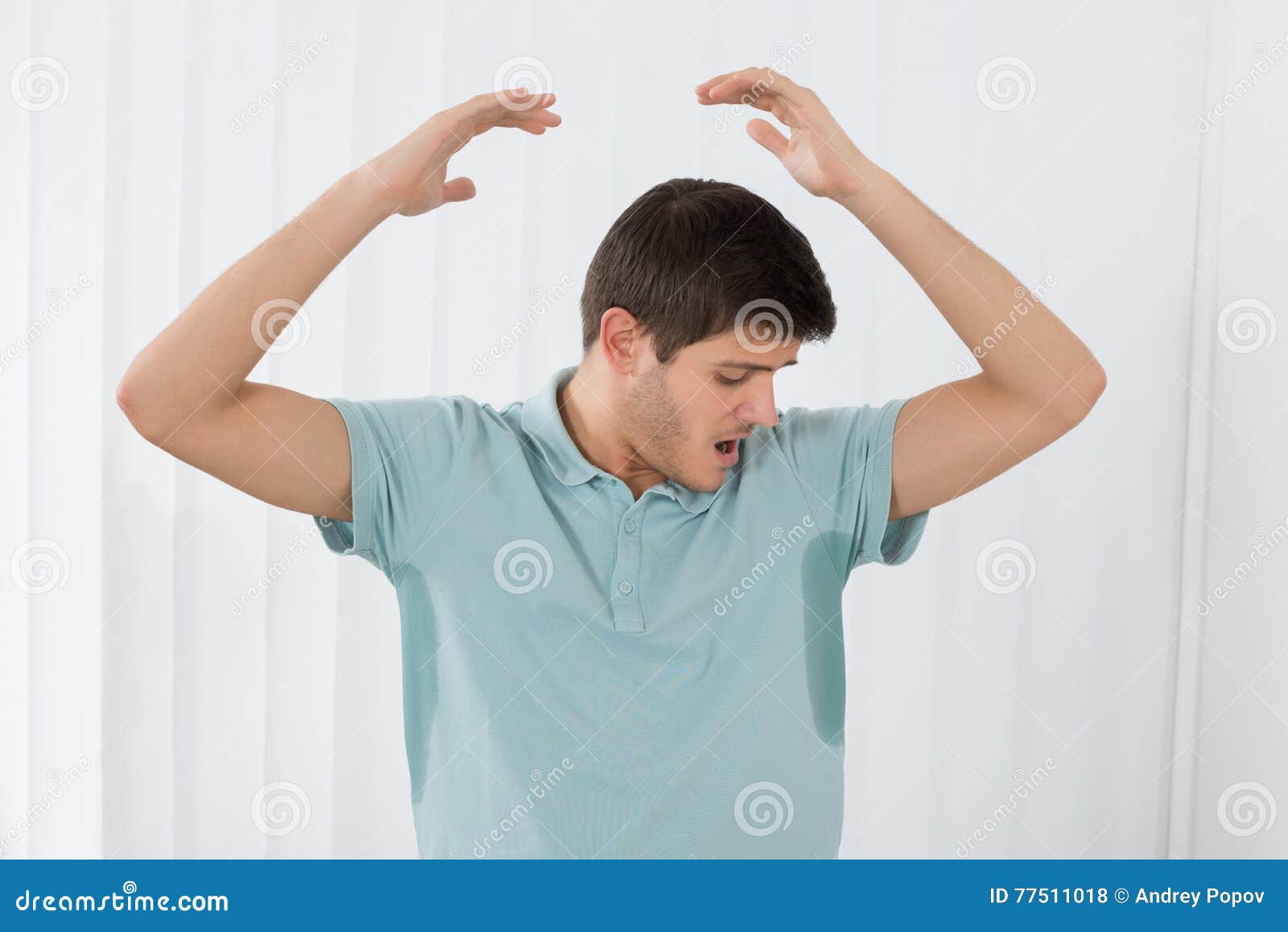 Man Sweating Very Badly Under Armpit Stock Photo - Image of annoyed ...