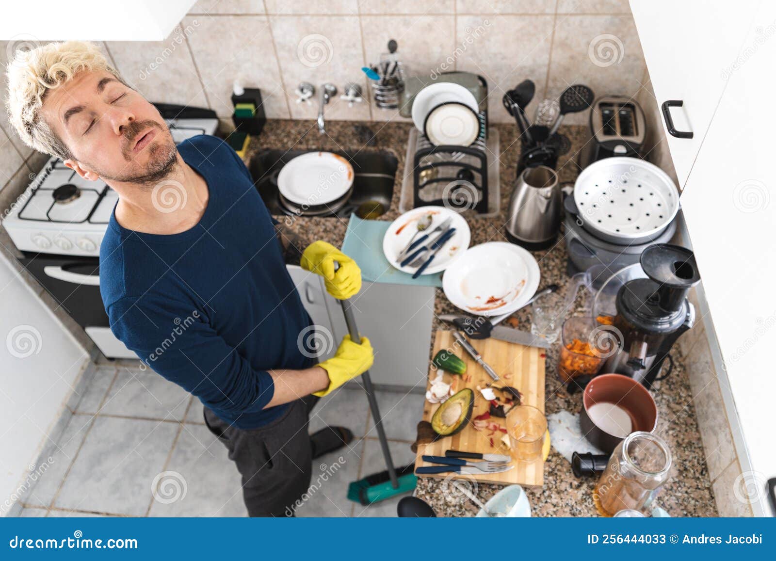 Man Sweeping with Broom Complaining about Cleaning Messy Kitchen Stock ...