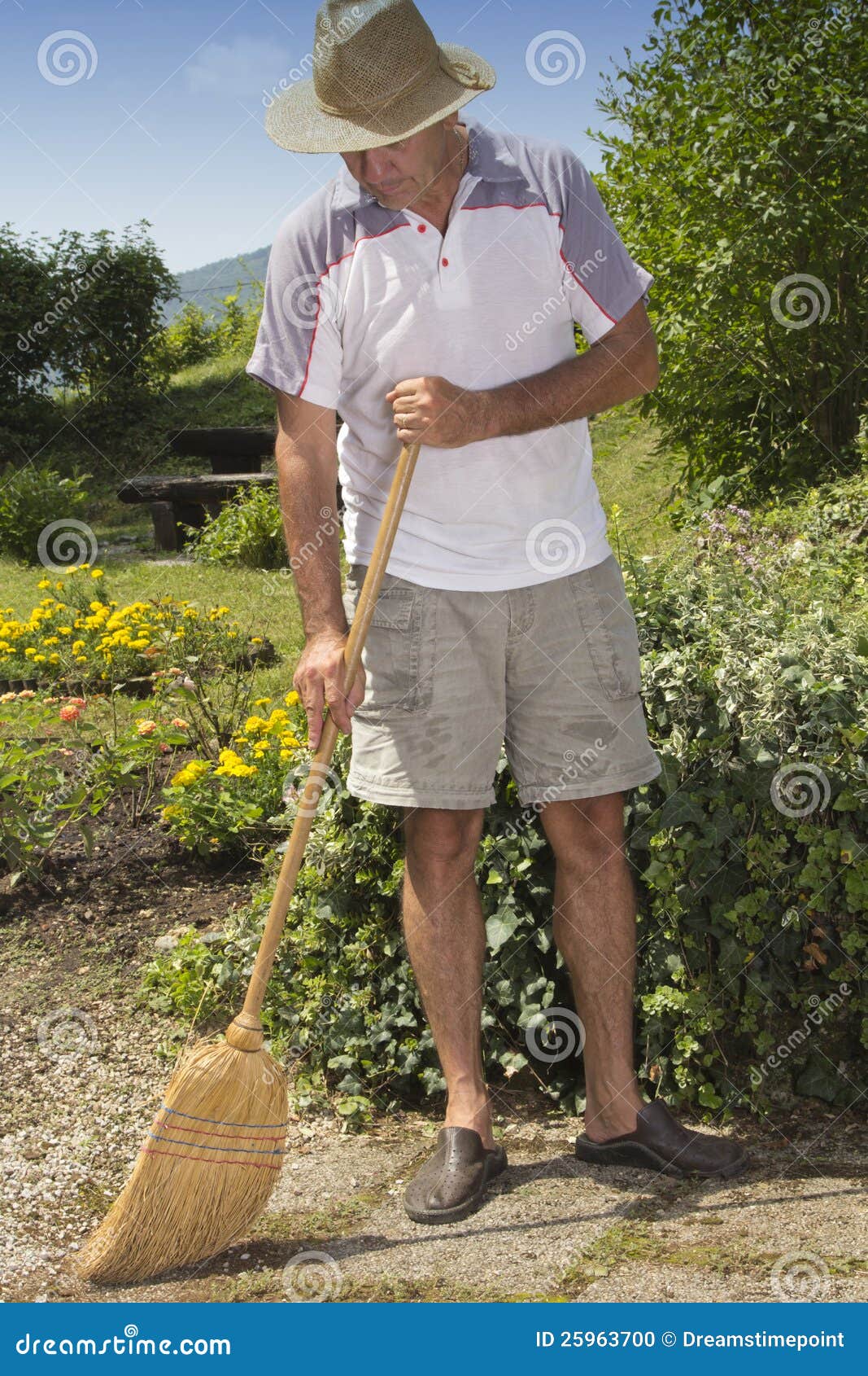 Man sweeping garden path stock photo. Image of work, brooming - 25963700