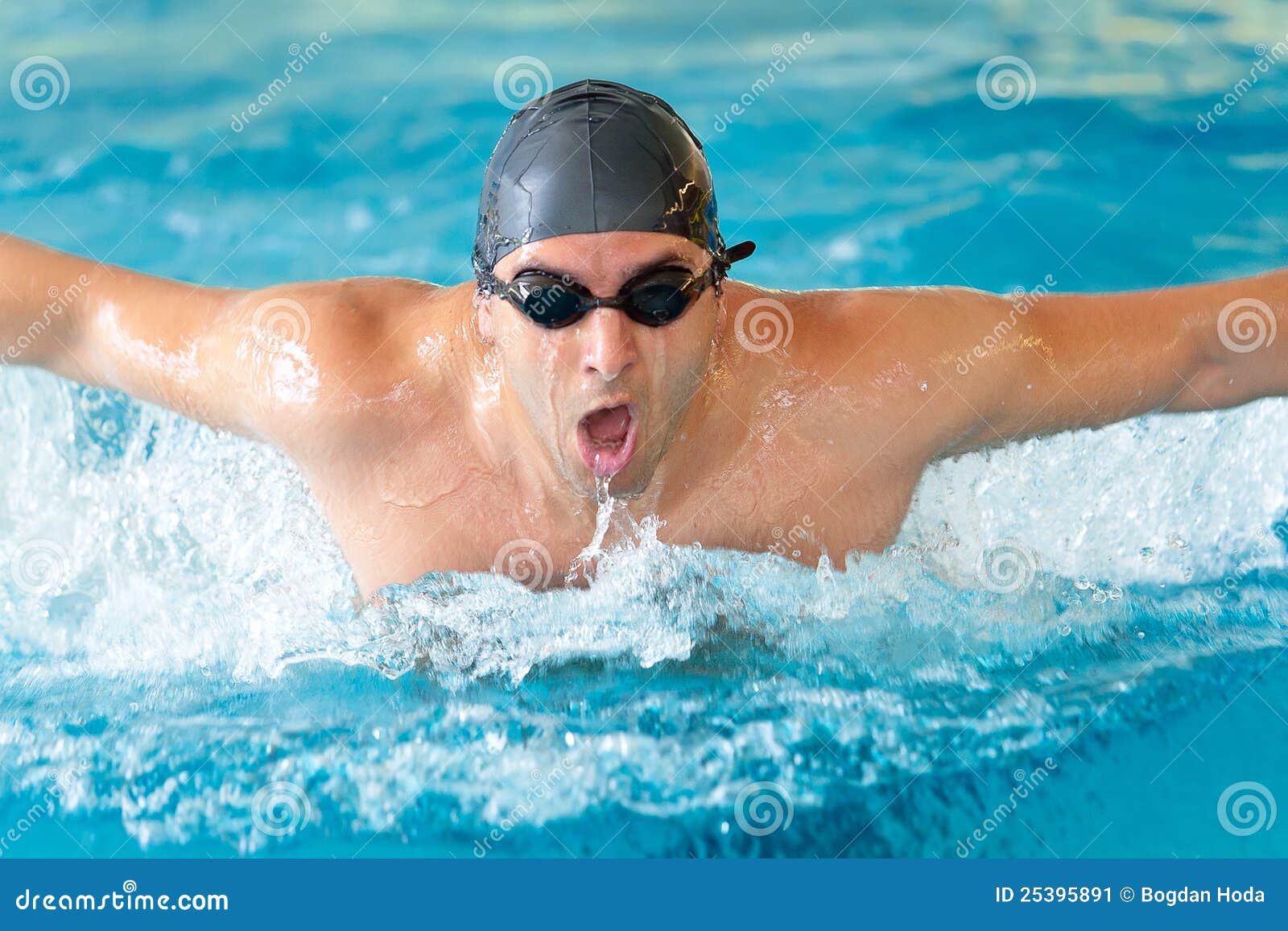 Man Swimming Butterfly Strokes in Competition Stock Image - Image of ...