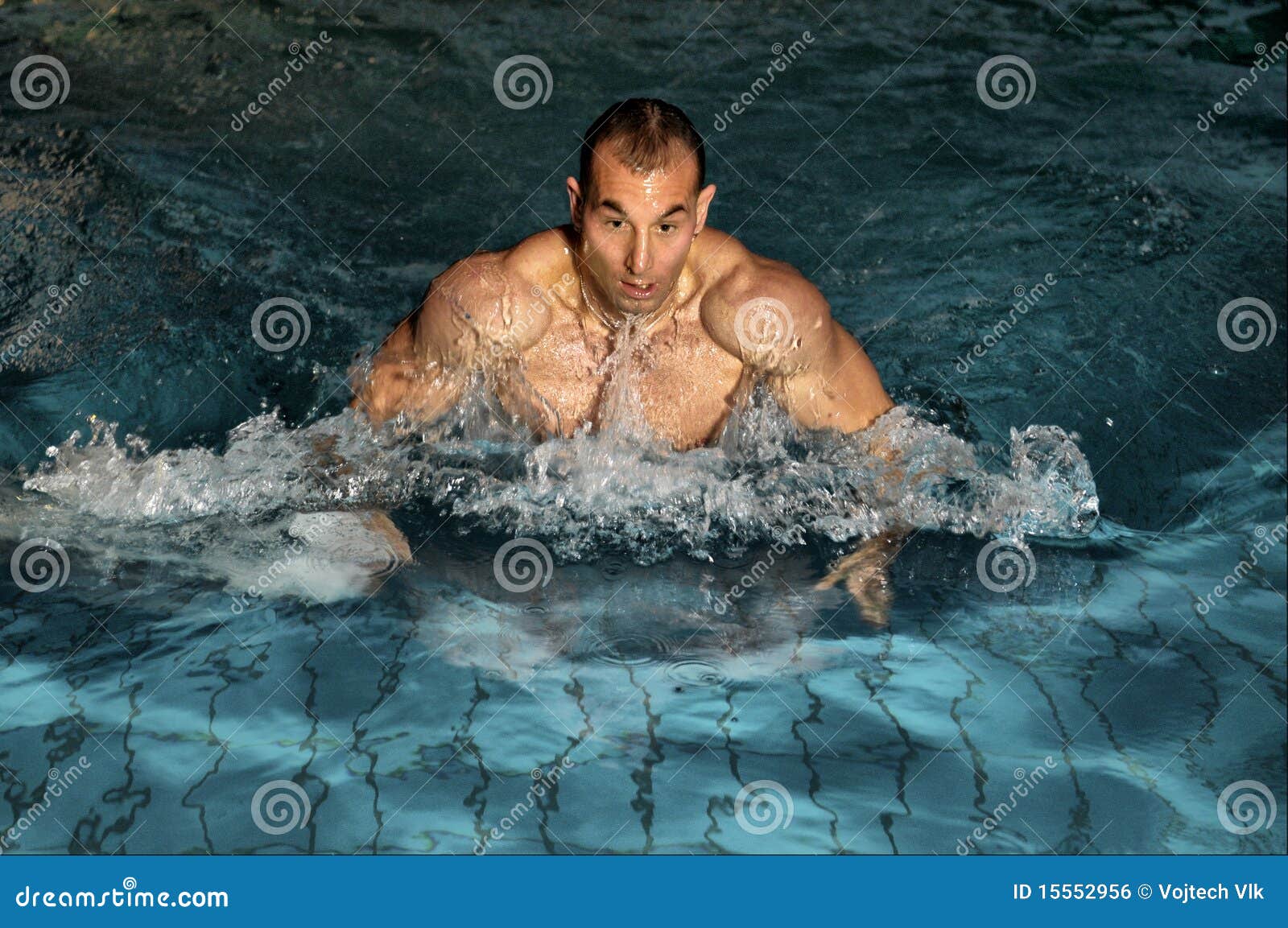 The man in swimming pool stock photo. Image of muscle - 15552956
