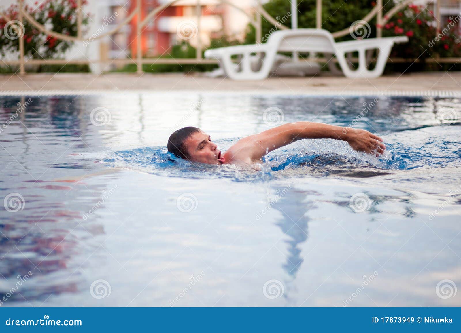 Man swimming in pool stock image. Image of power, swimming - 17873949