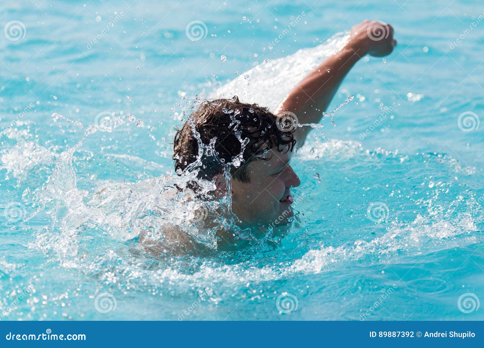 The Man is Swimming in the Pool Stock Photo - Image of male, handsome ...