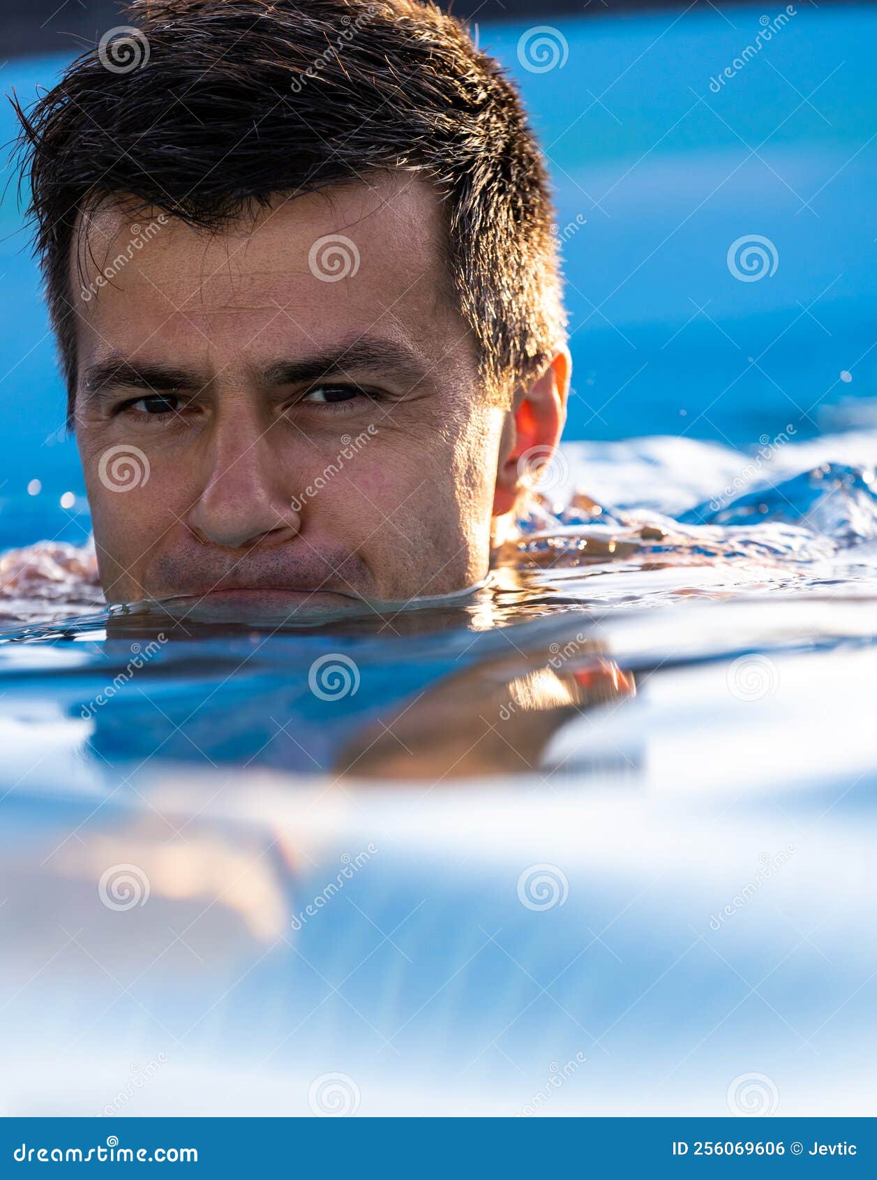 Man swimming in pool stock photo. Image of leisure, pool - 256069606
