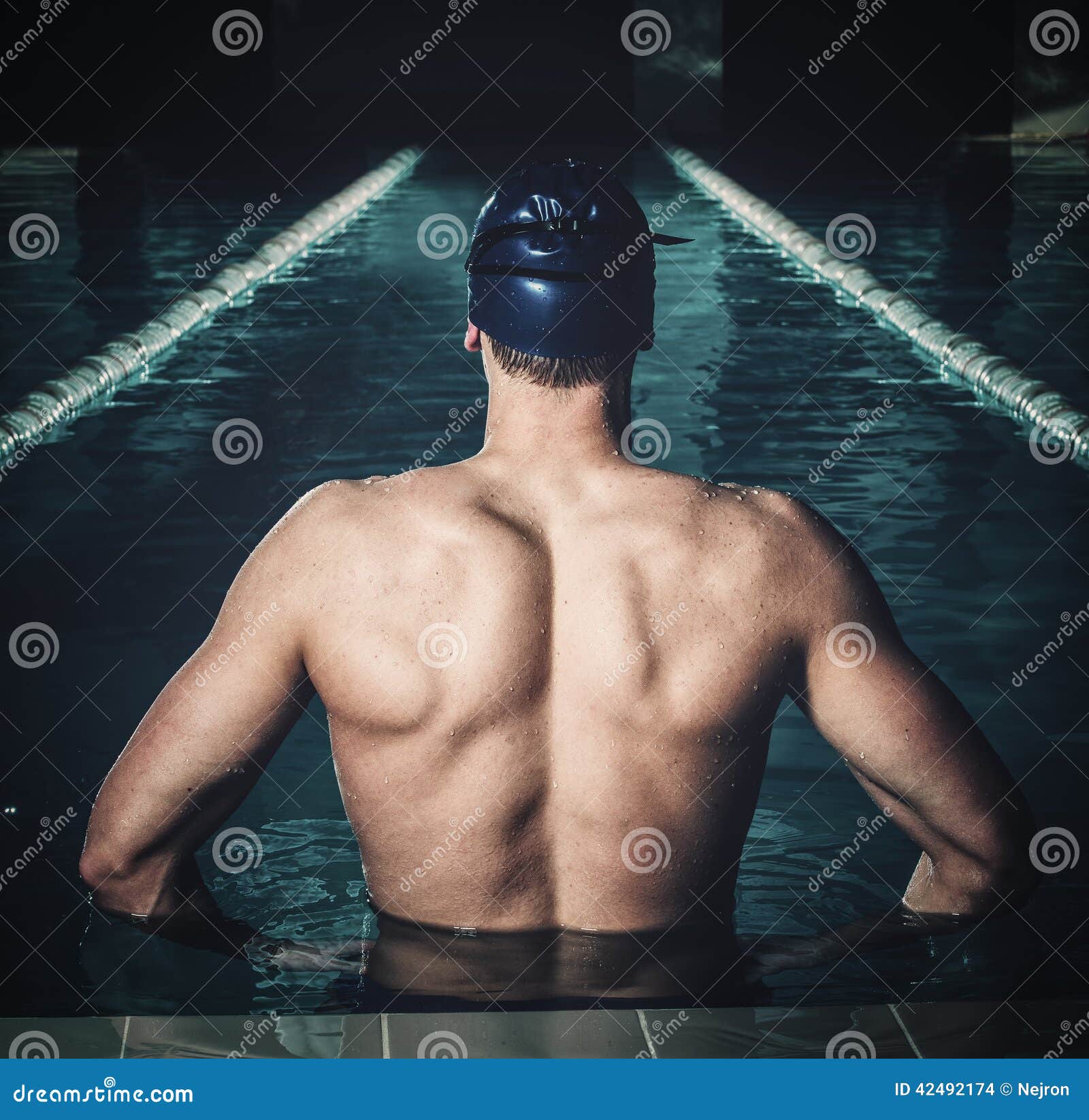 Man in swimming pool stock photo. Image of breaststroke - 42492174