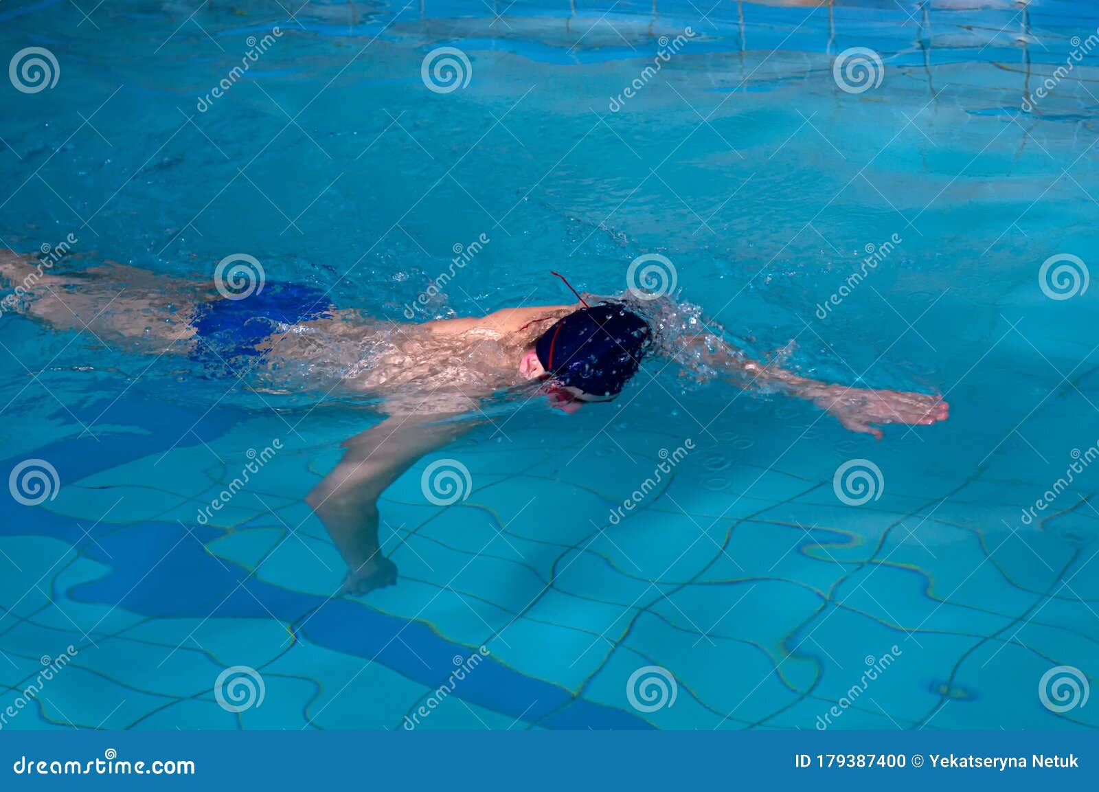 Man Swims Forward Crawl Style in Swimming Pool Stock Photo - Image of ...