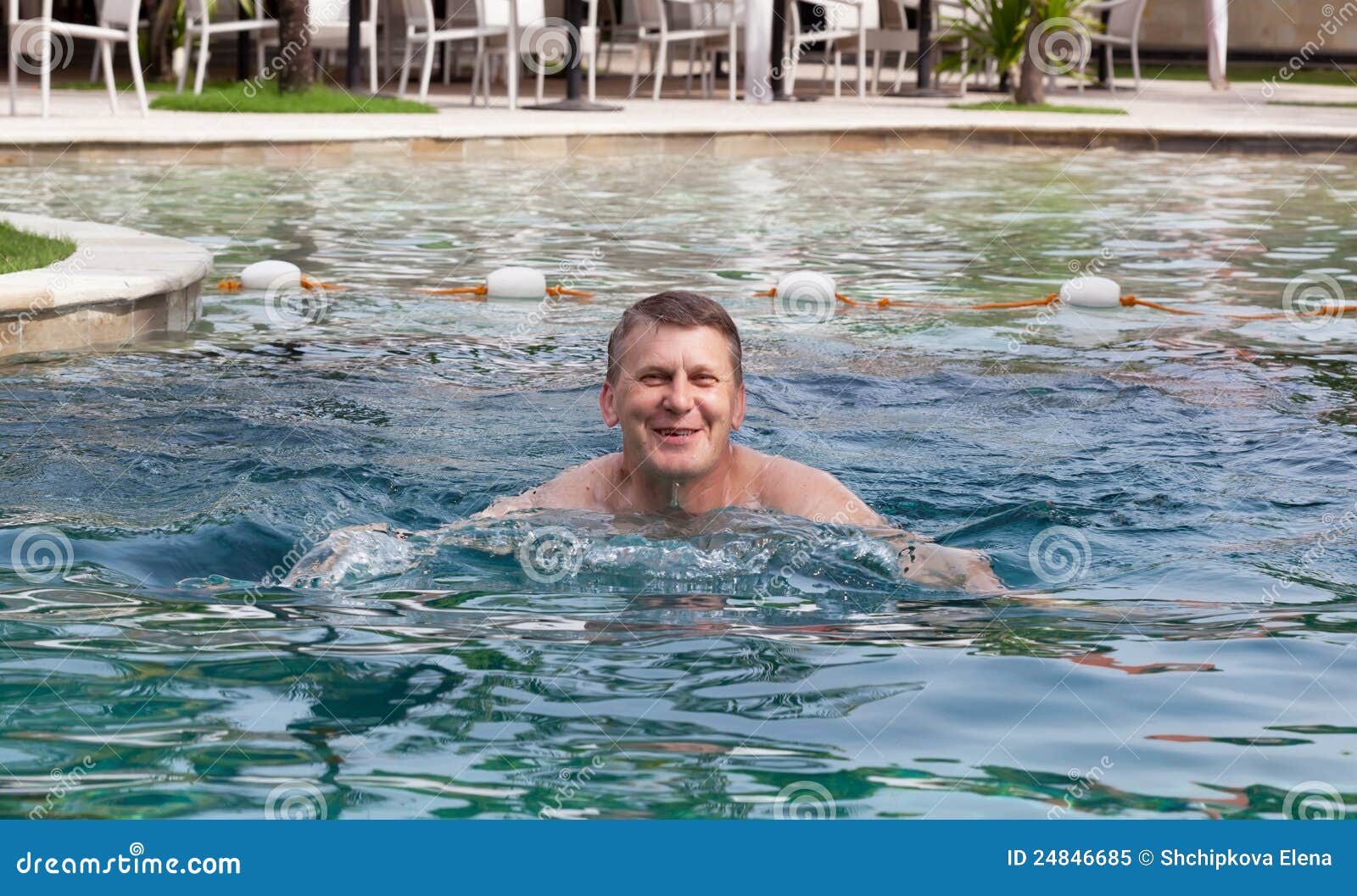 Man swims in the pool stock image. Image of floats, pool - 24846685 Man swims in the pool stock image. Image of floats, pool - 24846685