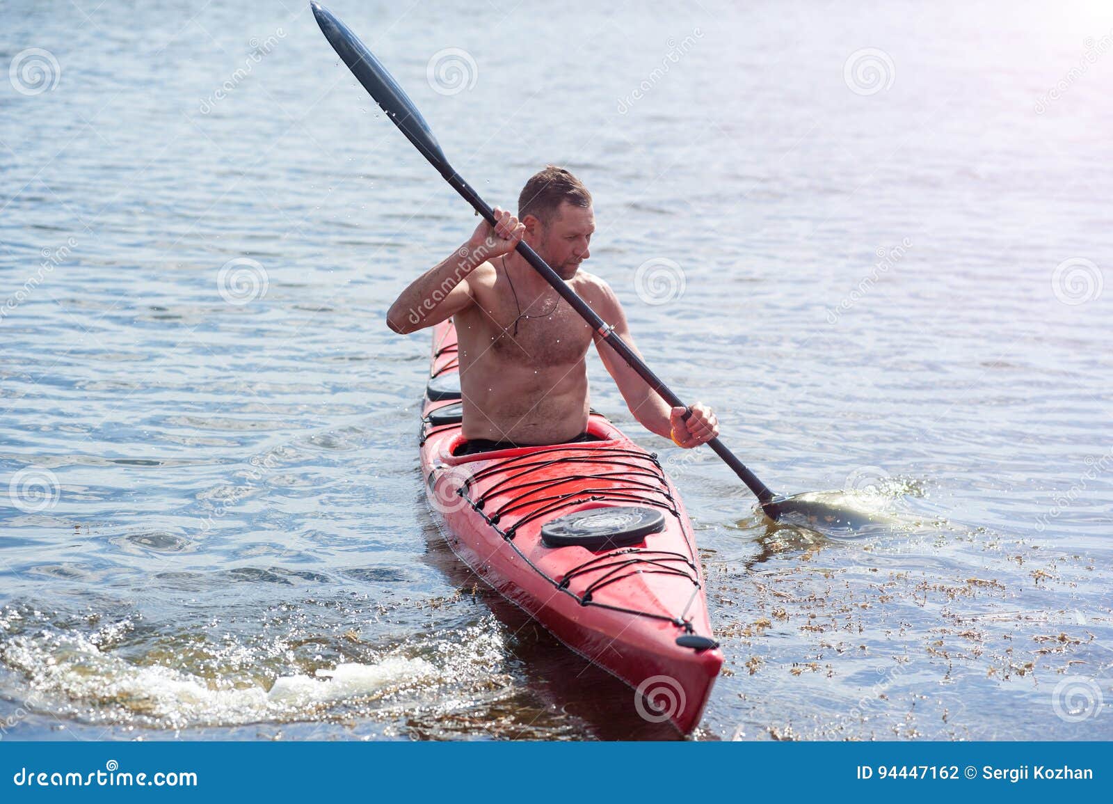Man Swims on a Red Kayak 02 Stock Photo - Image of happy, sailing: 94447162