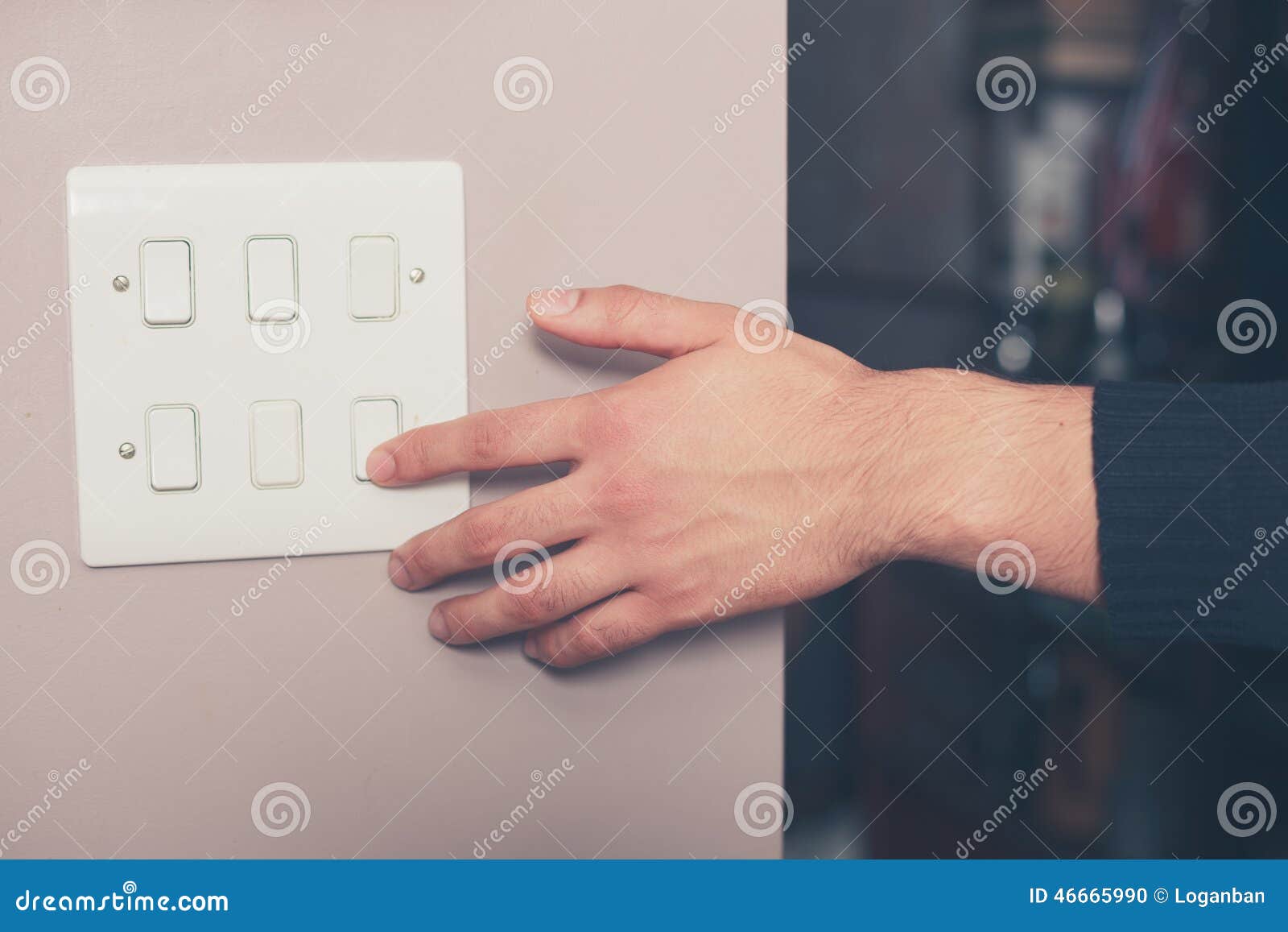 Man switching on lights stock photo. Image of switches - 46665990