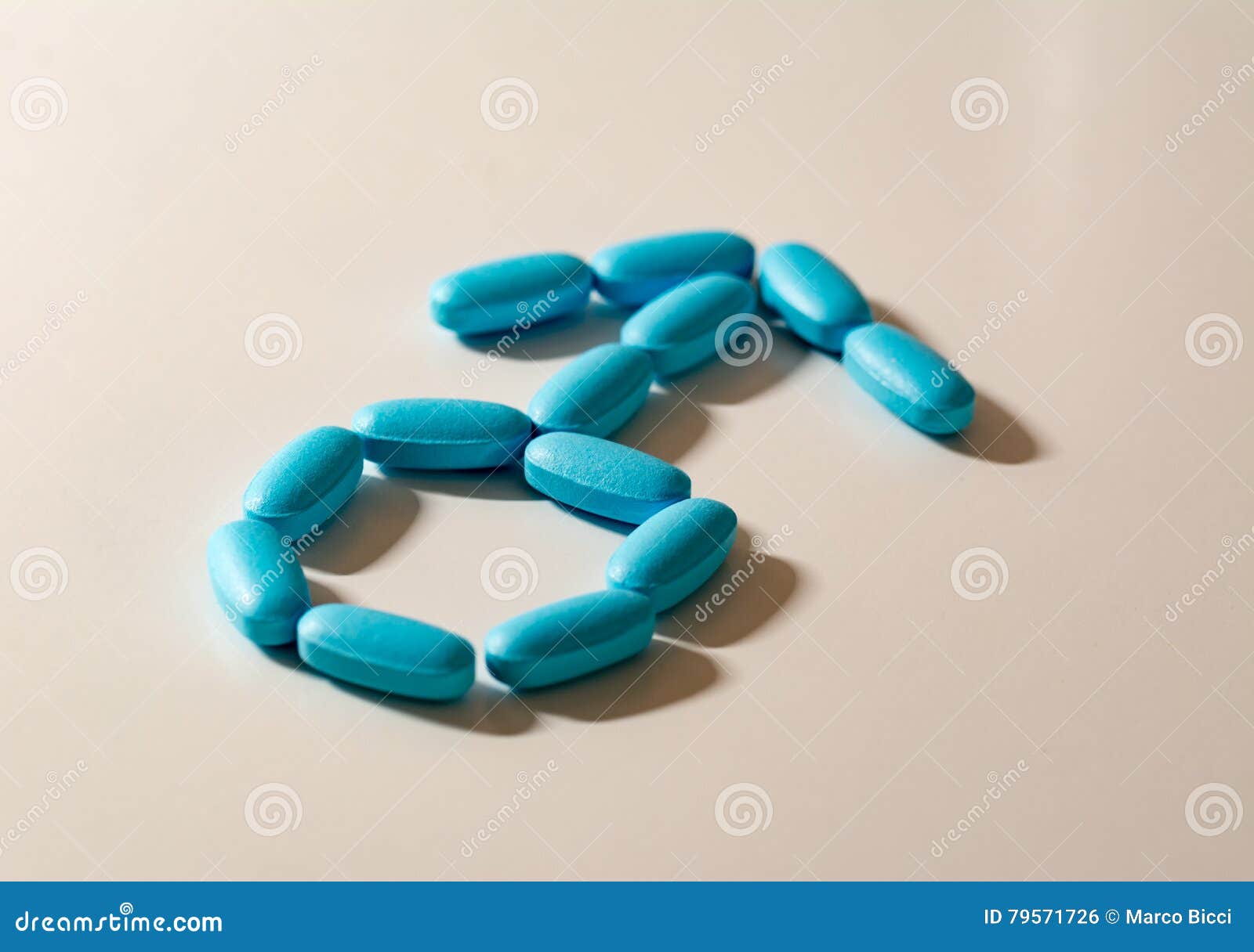 Man Symbol Formed by Blue Tablets Whose Color is Reminiscent of Stock ...