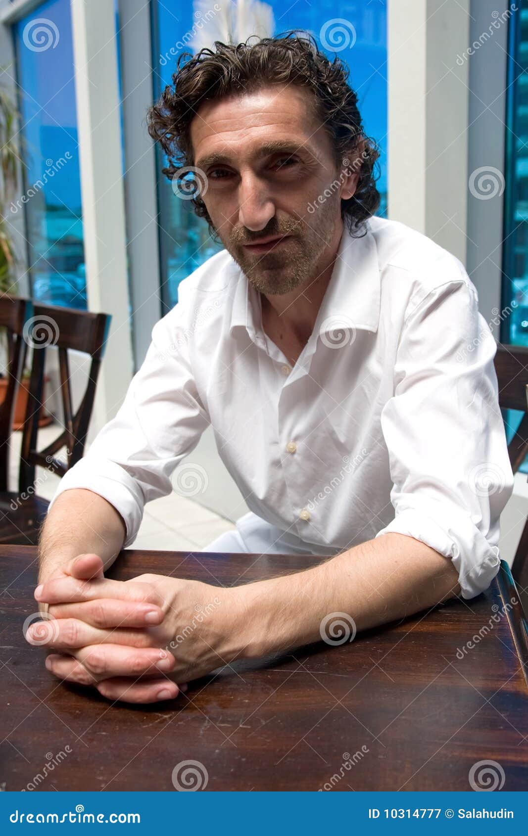 Man at the table stock image. Image of direct, hair, table - 10314777
