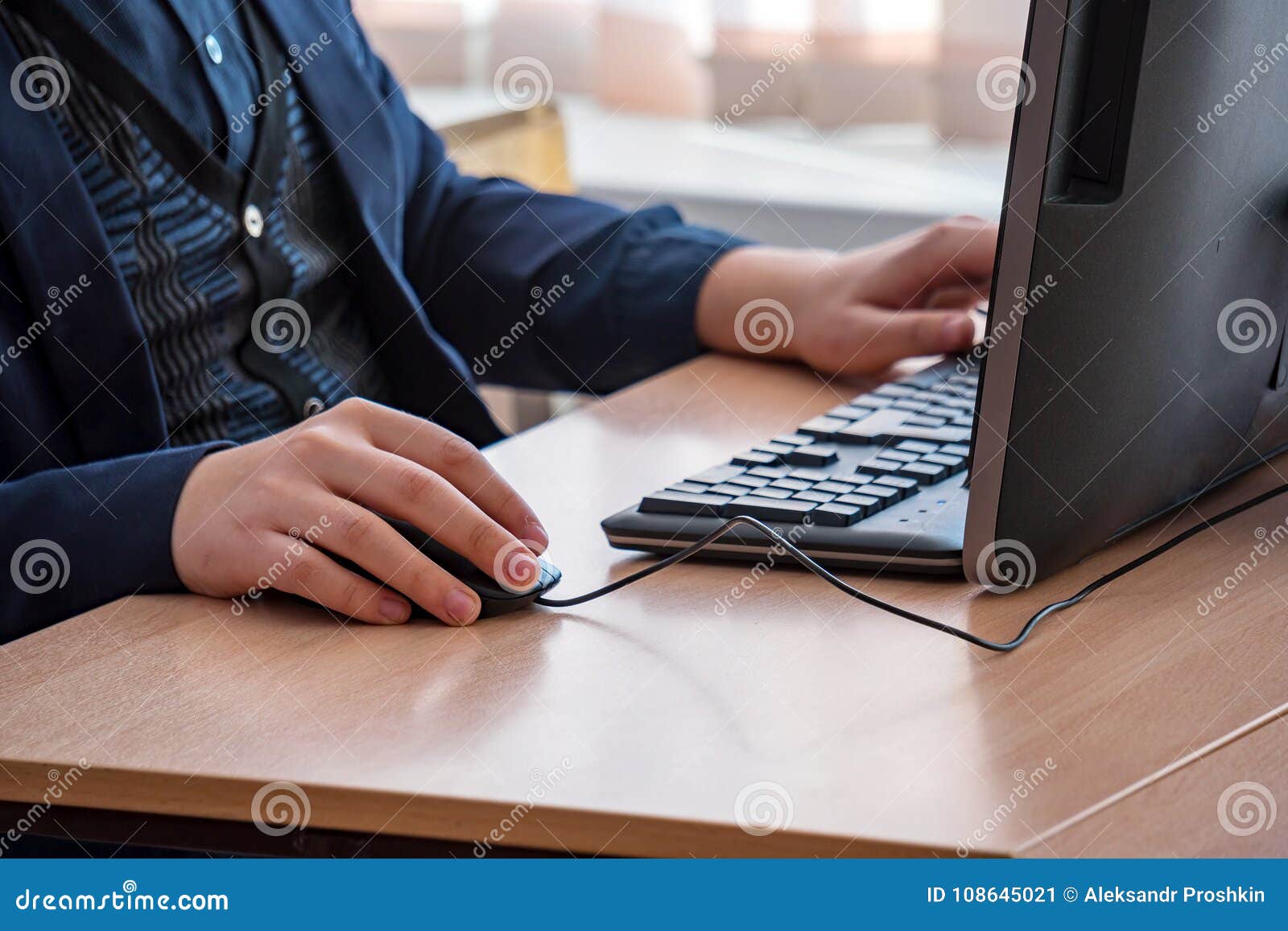 Man at the Table in Front of the Computer Stock Image - Image of male ...