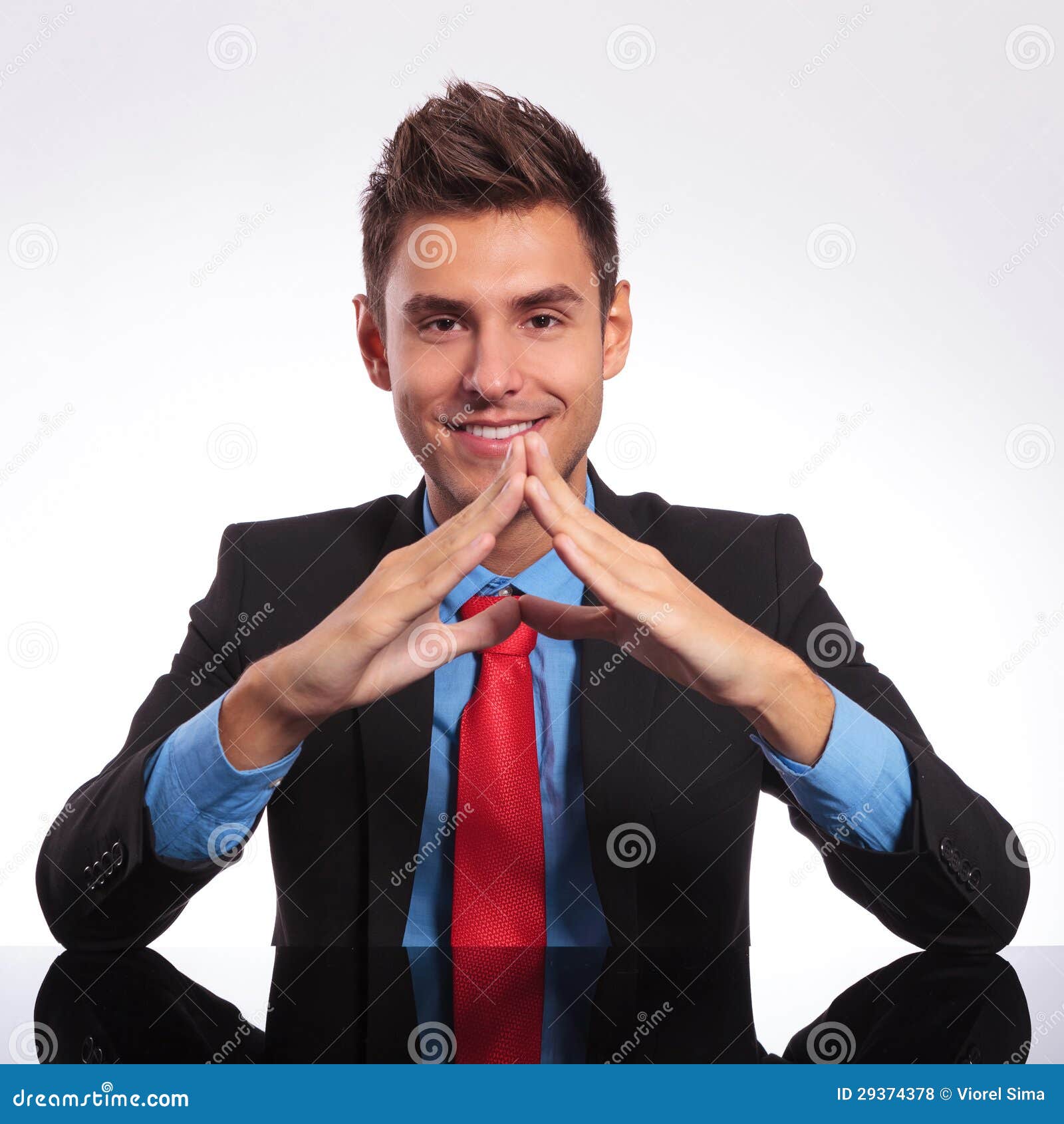 Man at Table with Hands Together Stock Photo - Image of hands ...
