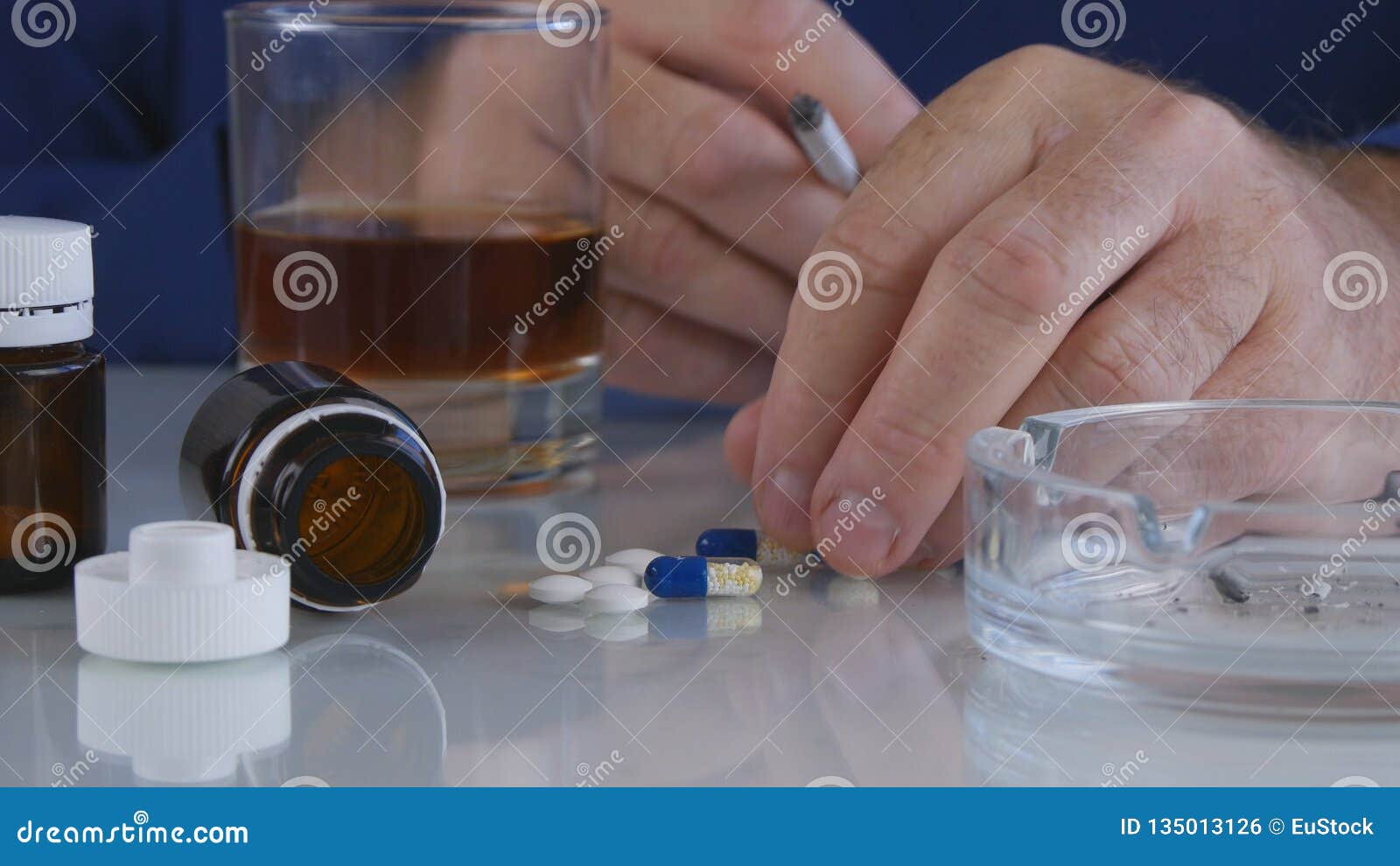Man on the Table Select Medical Pills Drink Alcohol and Smoke a ...