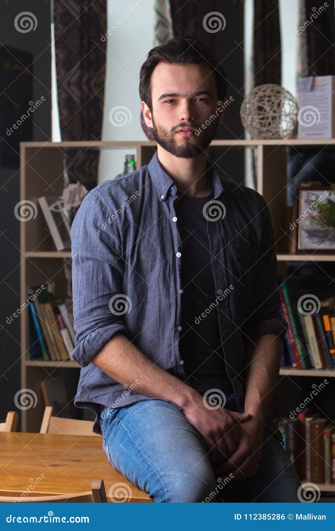 Man on the table stock photo. Image of confident, face - 112385286