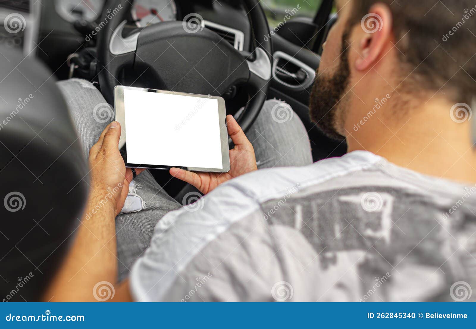 A Man with a Tablet in a Car. Stock Photo - Image of happy, young ...