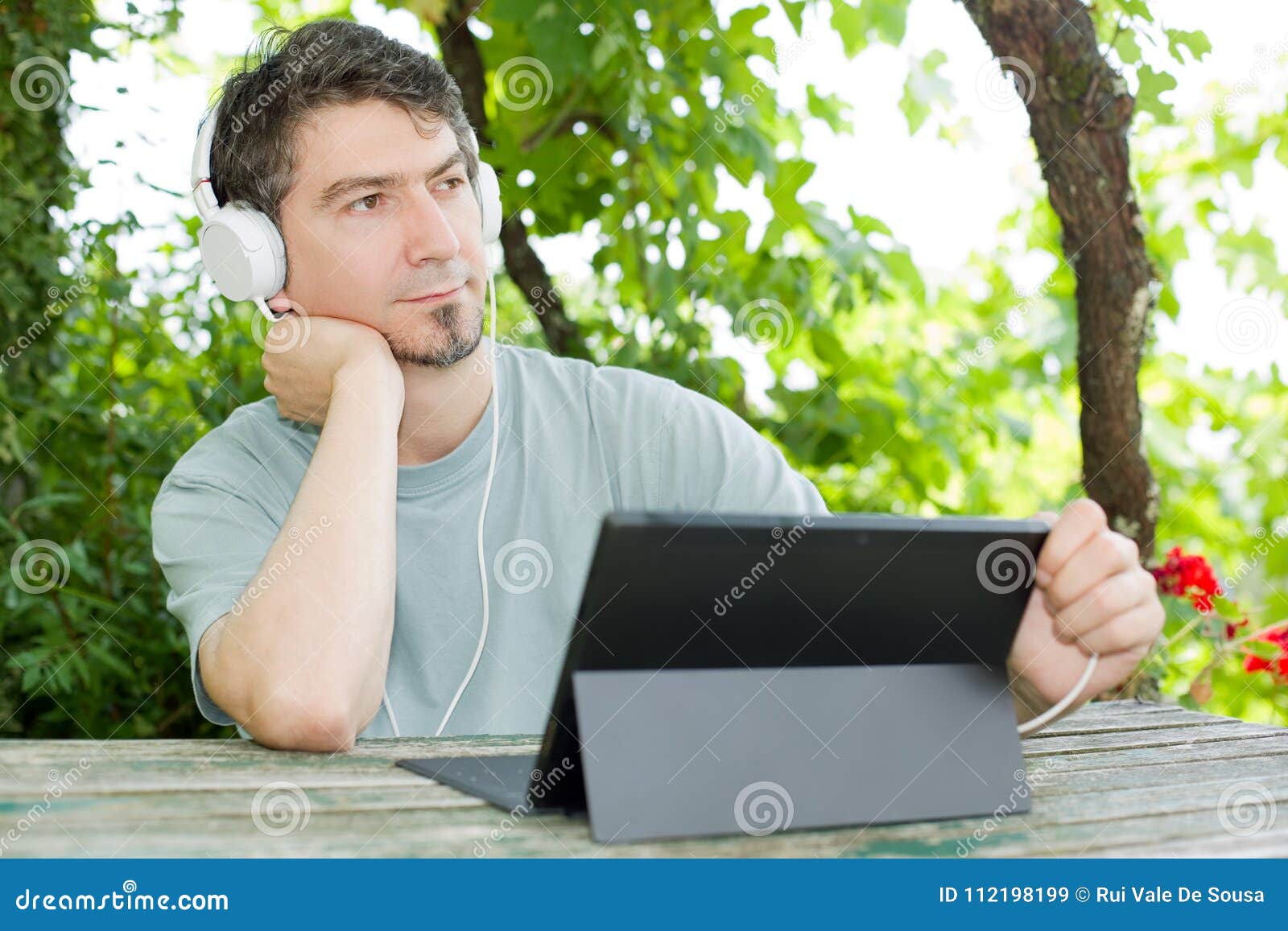Man with tablet stock image. Image of male, outdoors - 112198199