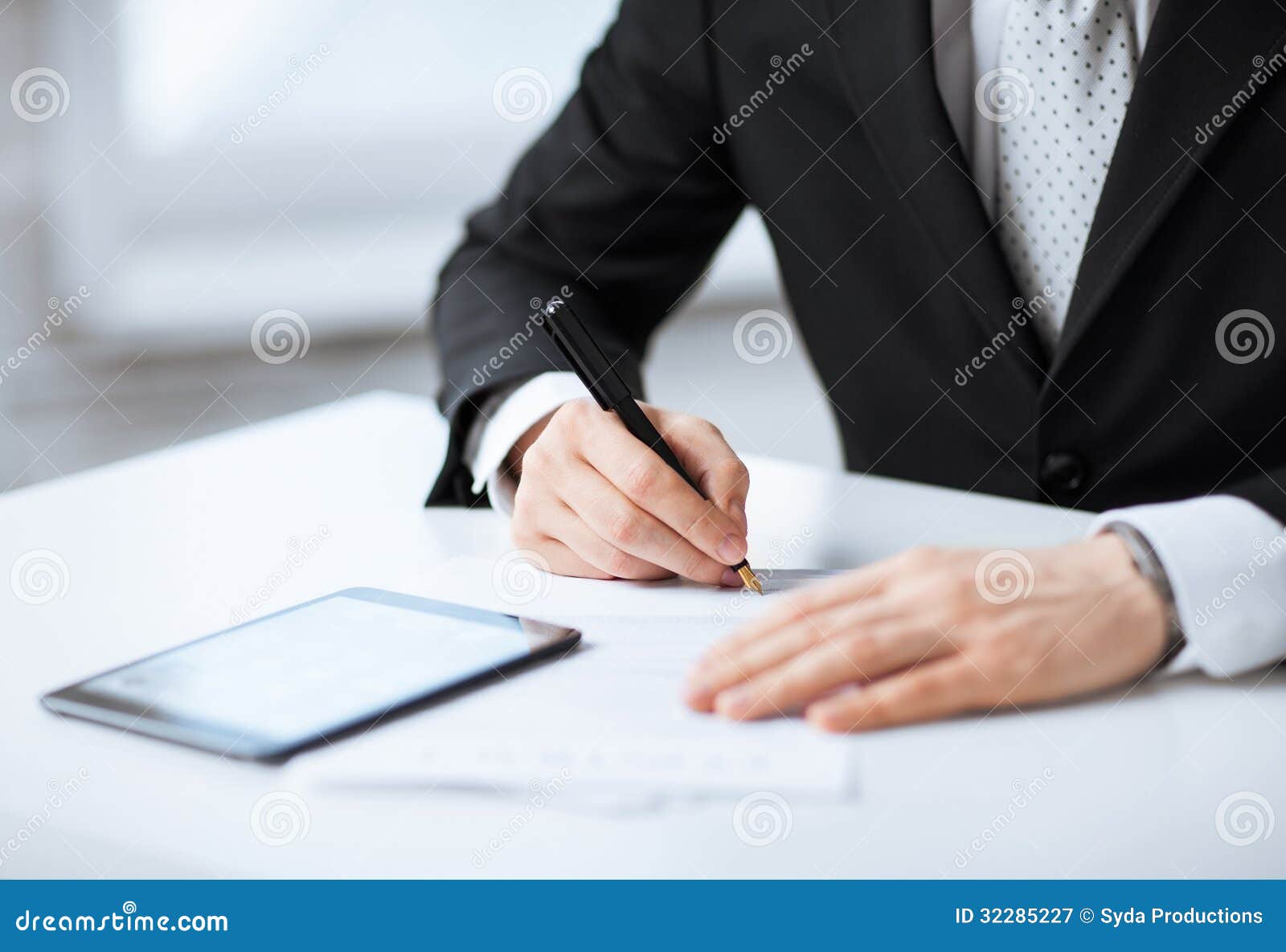Man with Tablet Pc Signing Paper Stock Image - Image of partnership ...