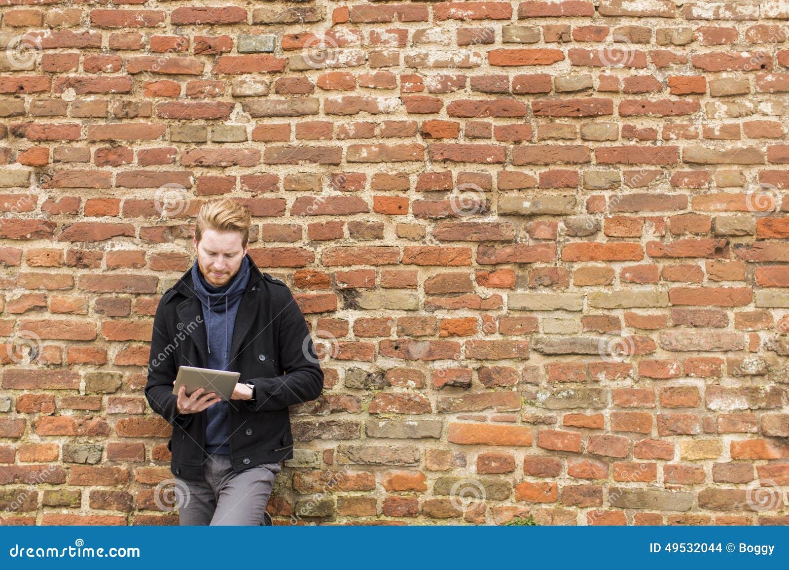 Man with tablet stock photo. Image of urban, wall, caucasian - 49532044
