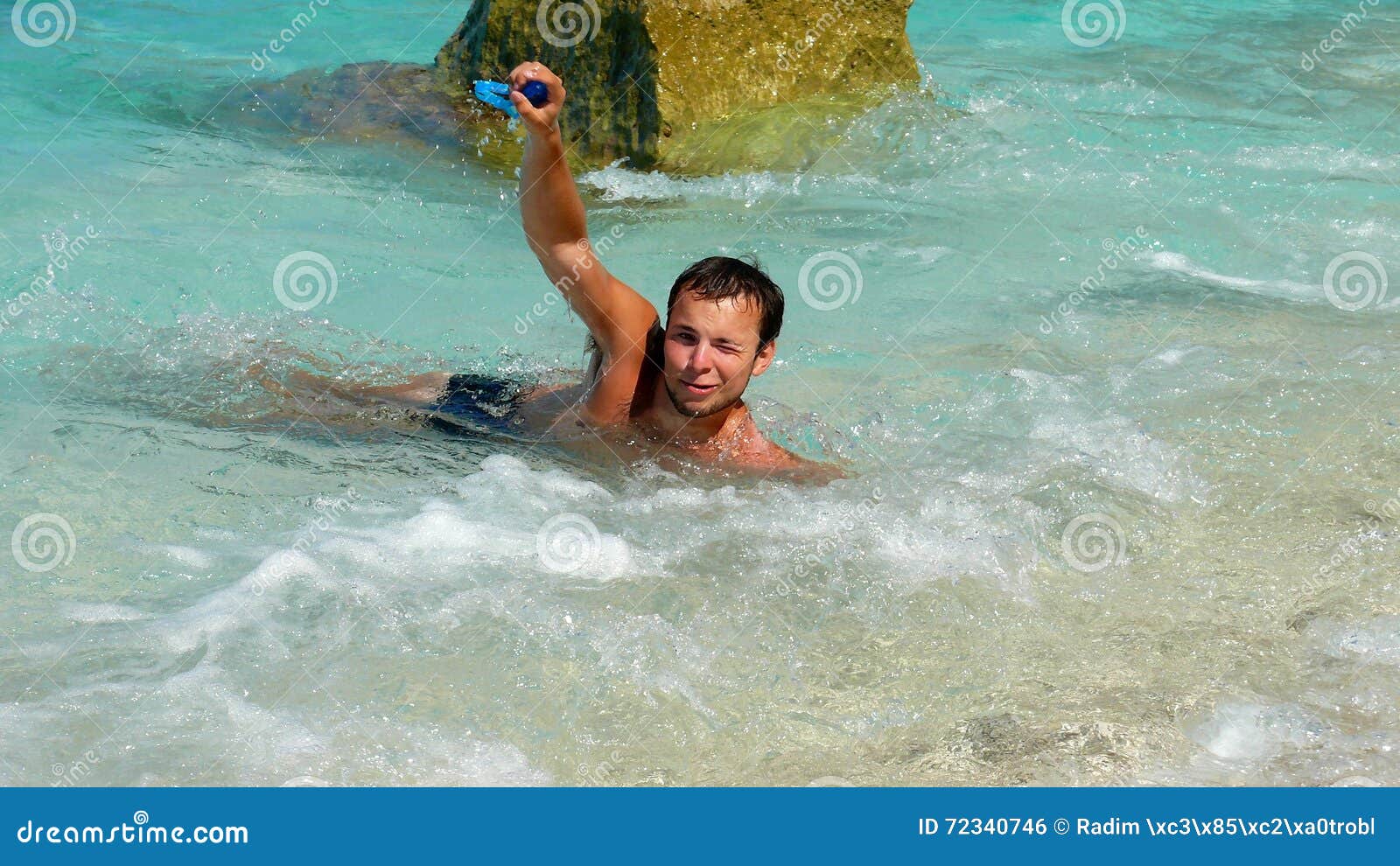 Man taken down by wave stock photo. Image of view, happiness - 72340746