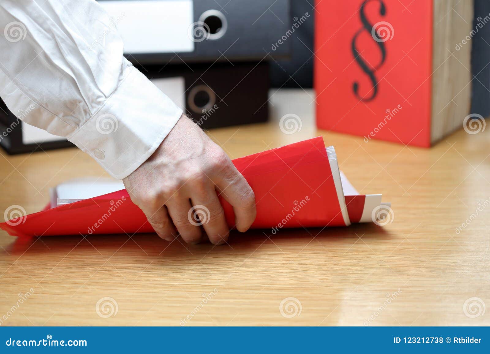 Man takes a file- folder stock photo. Image of binder - 123212738