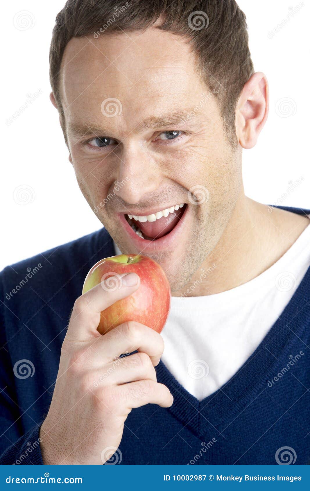 Man Taking Bite of Apple stock image. Image of eating - 10002987