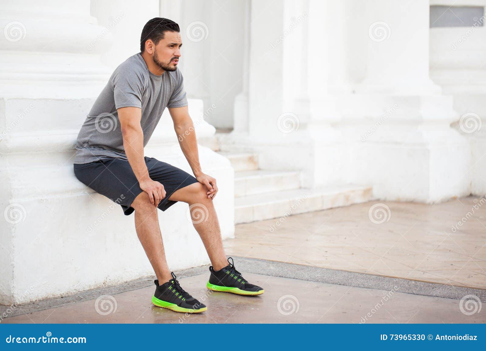 Man Taking a Break from Exercising Outdoors Stock Photo - Image of ...