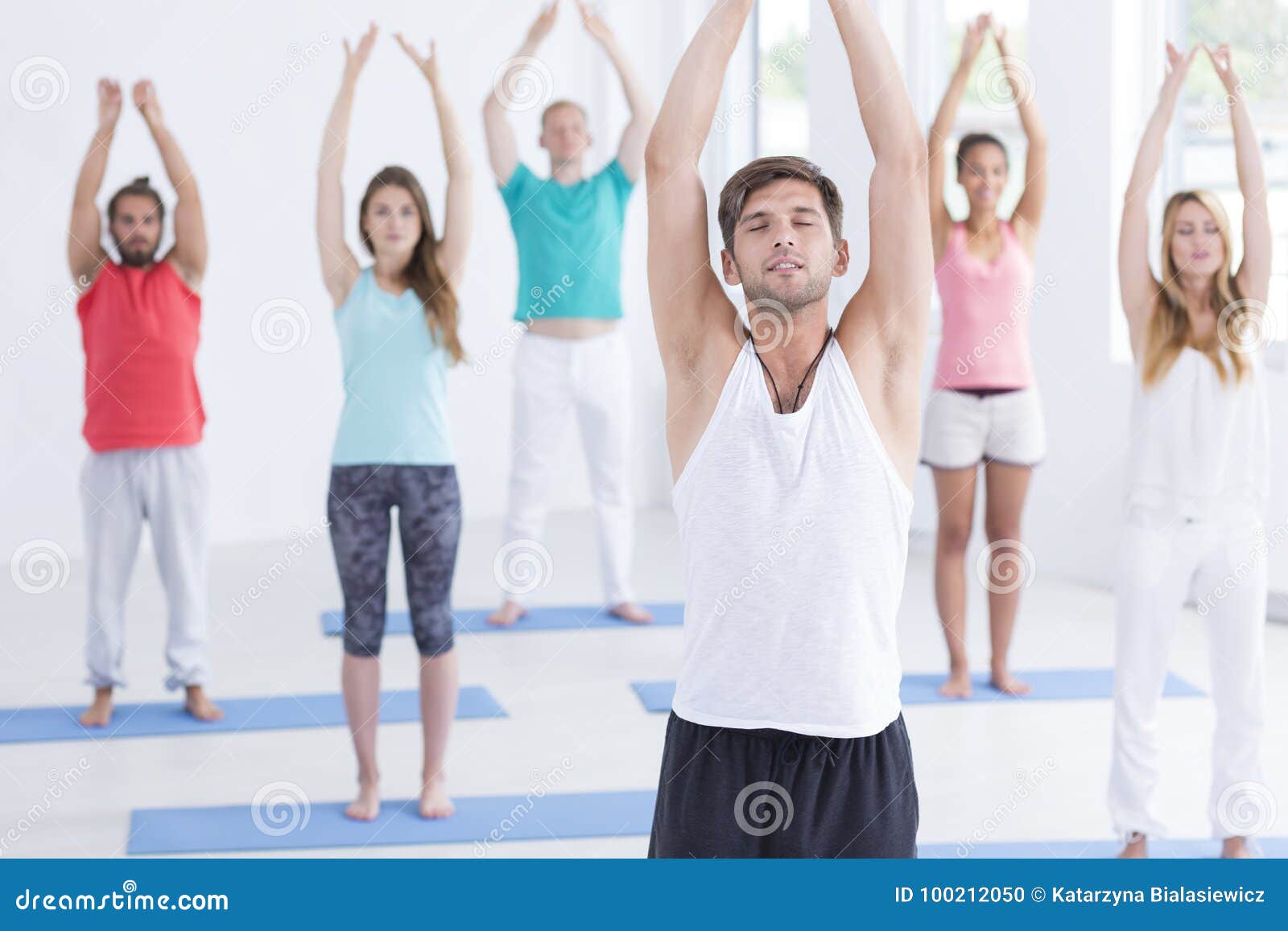 Man taking a deep breath stock photo. Image of stretching - 100212050