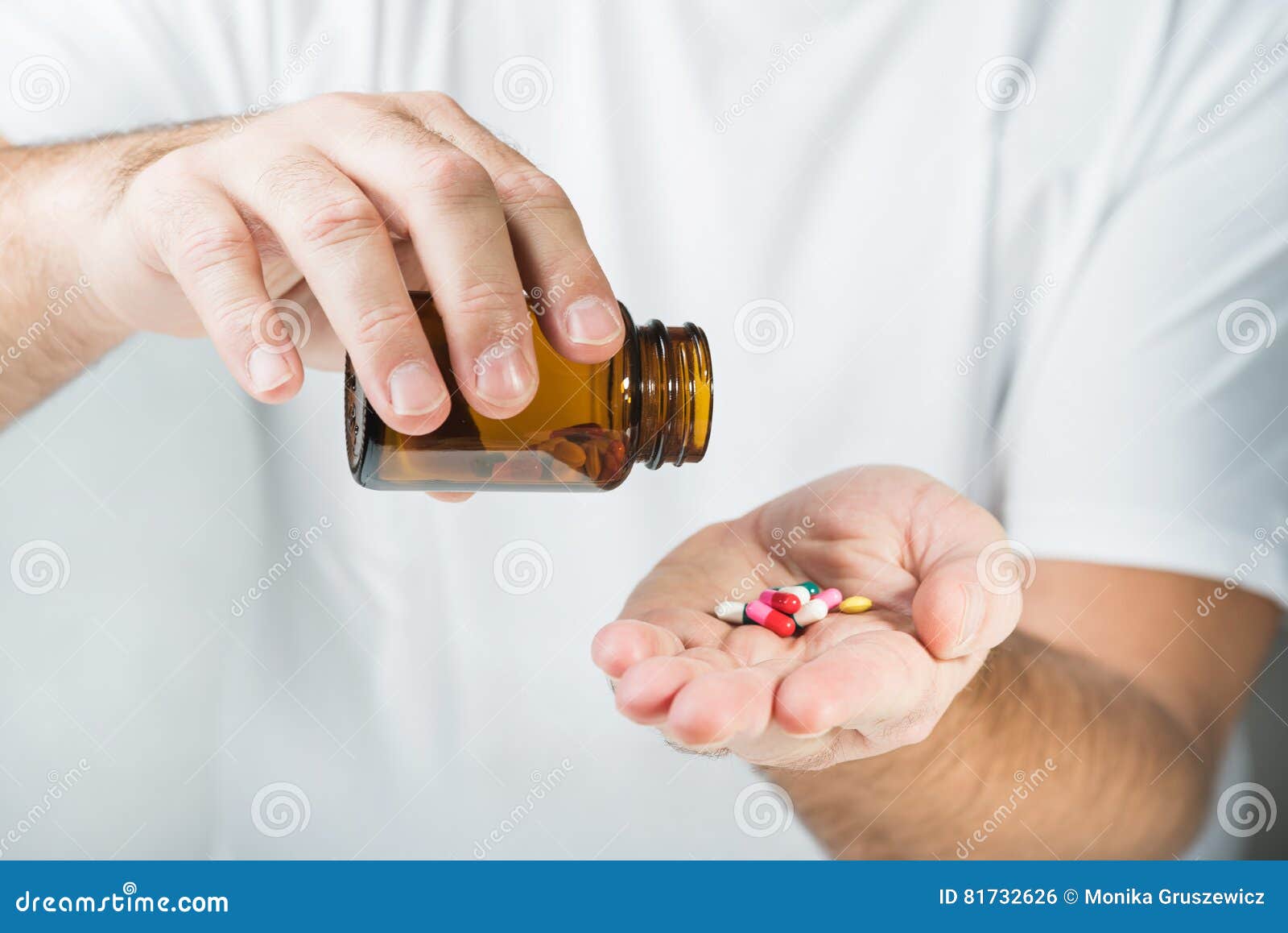 Man taking drugs stock photo. Image of medicines, ache - 81732626