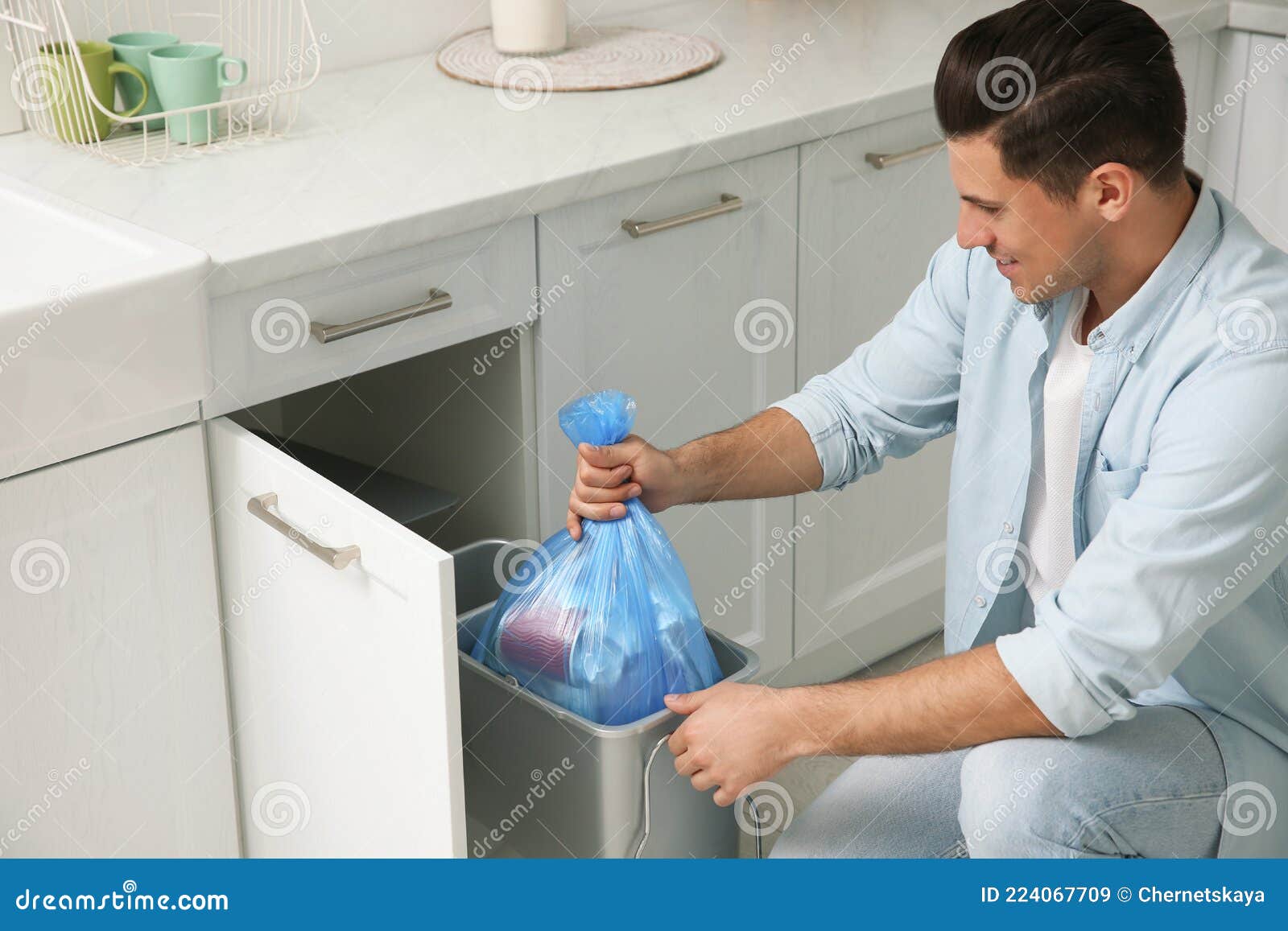 Man Taking Garbage Bag Out of Bin at Home Stock Image - Image of adult ...