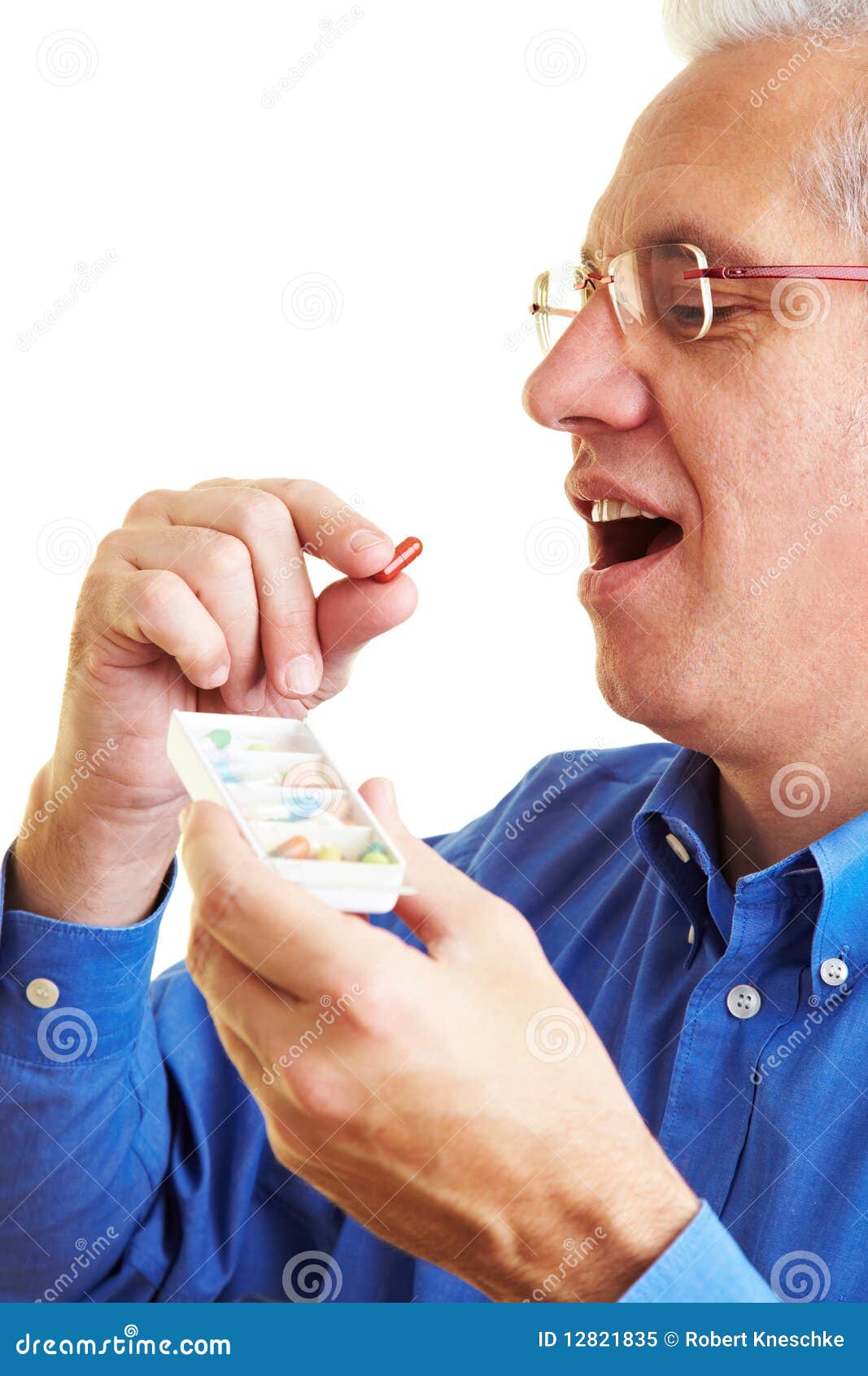 Man taking his medication stock image. Image of person - 12821835