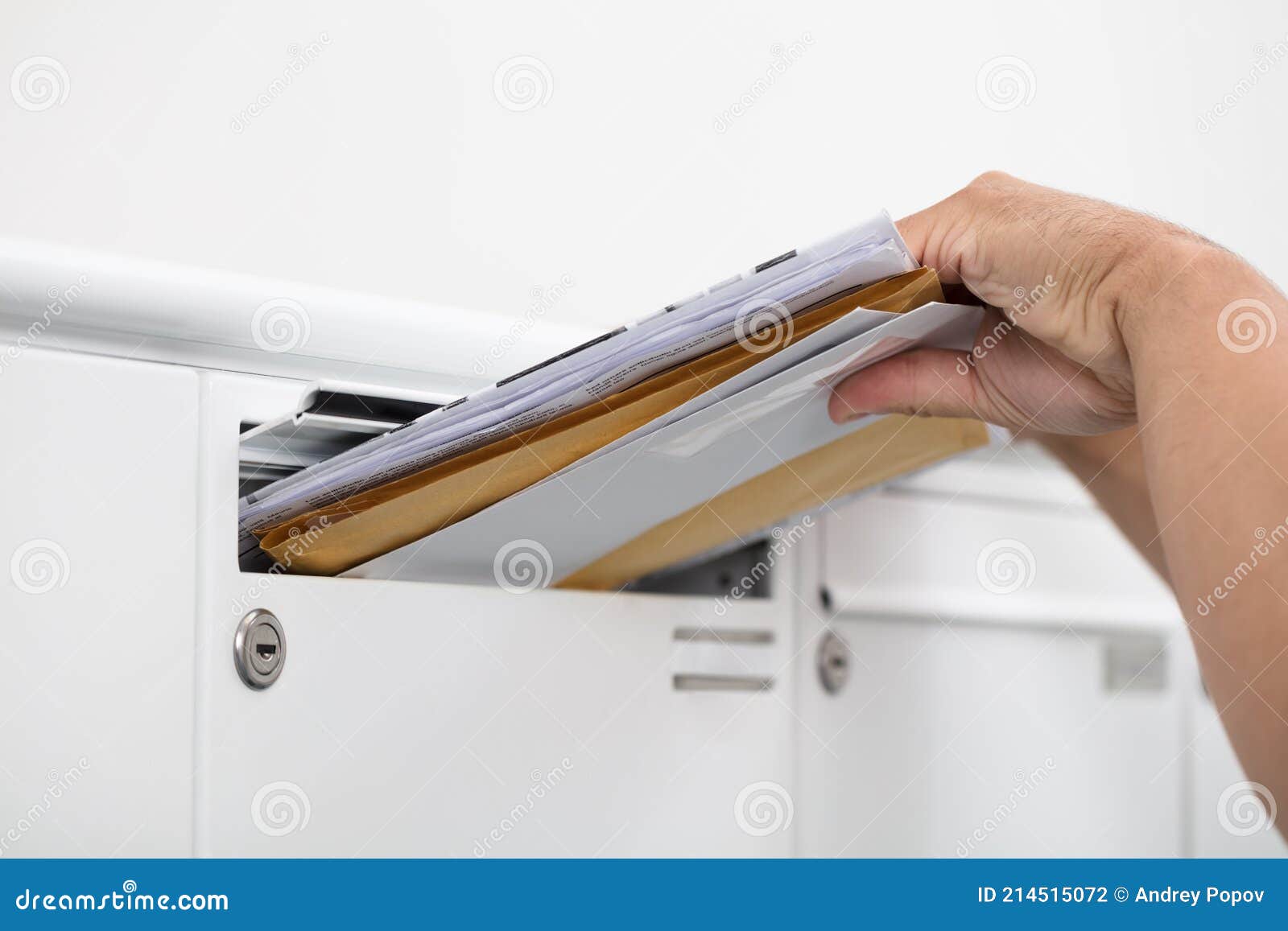 Man Taking Letters from Mailbox Stock Photo - Image of advertising ...