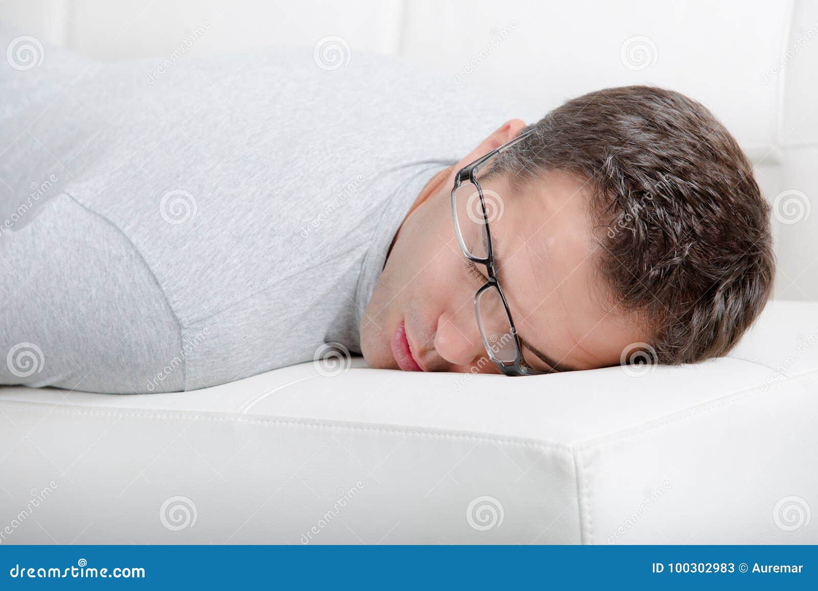 Man Taking Little Nap on Sofa Stock Image - Image of lifestyle, leisure ...