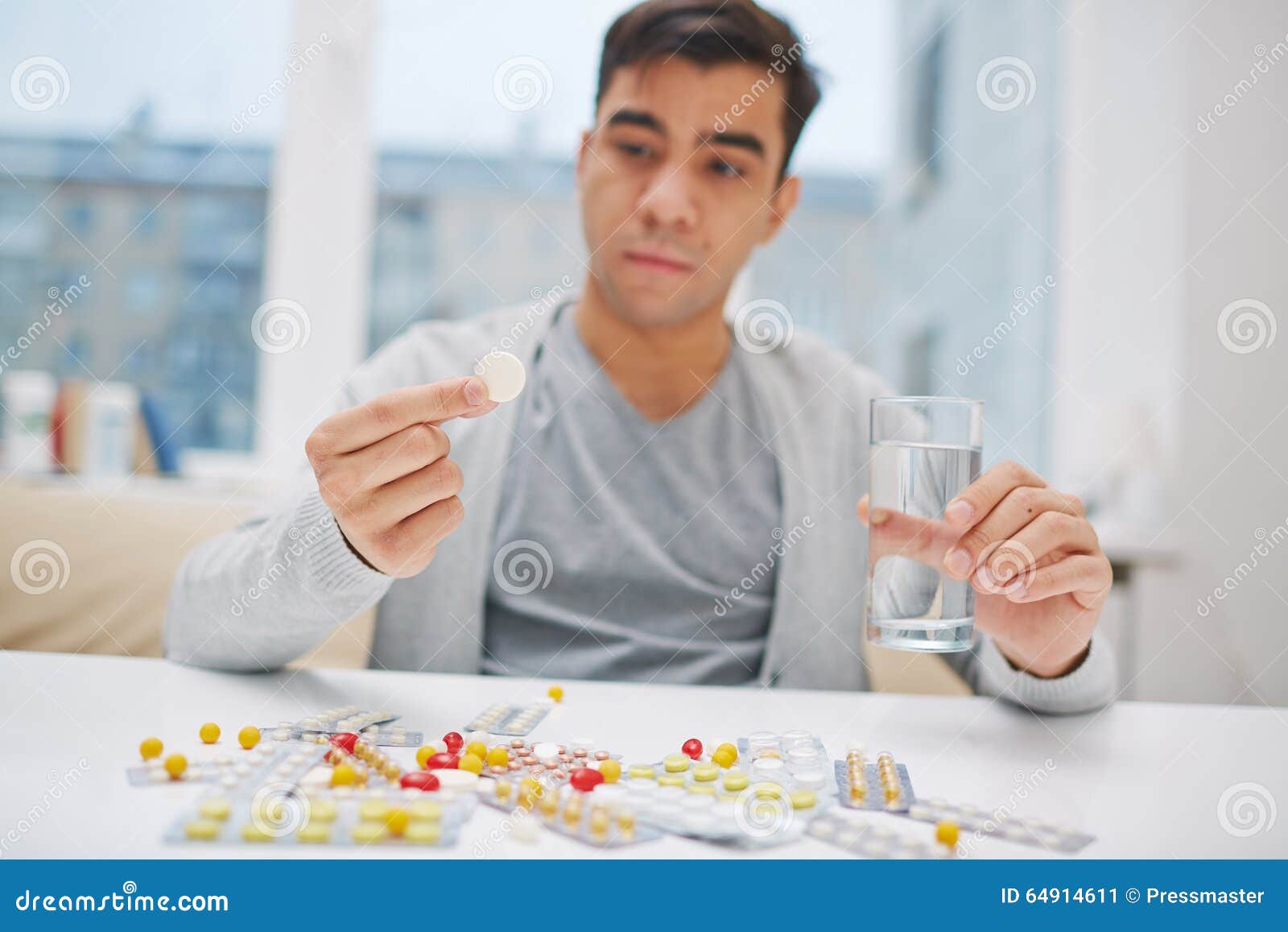 Man taking medications stock image. Image of medication - 64914611