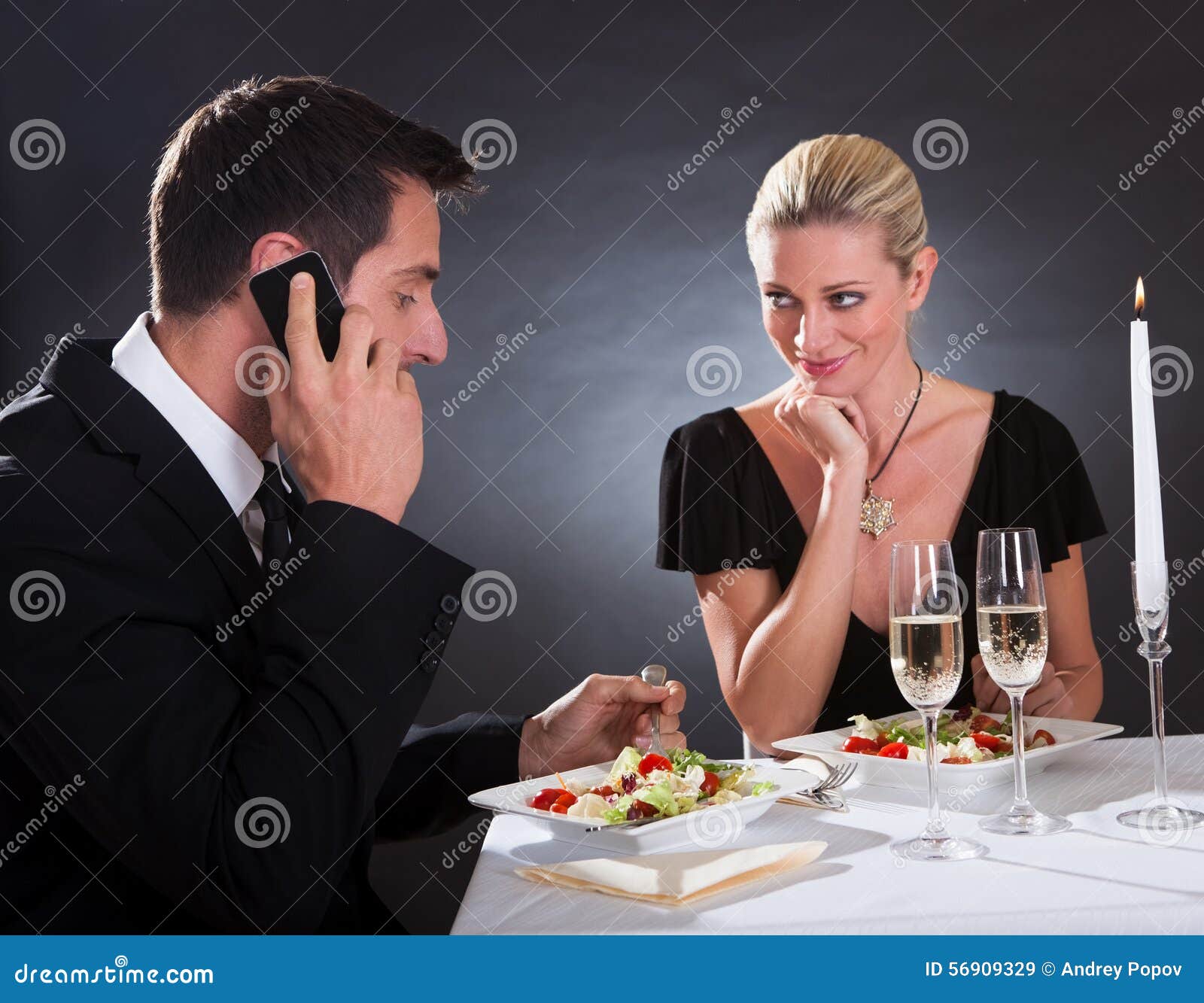 Man Taking a Mobile Call during Dinner Stock Image - Image of ...