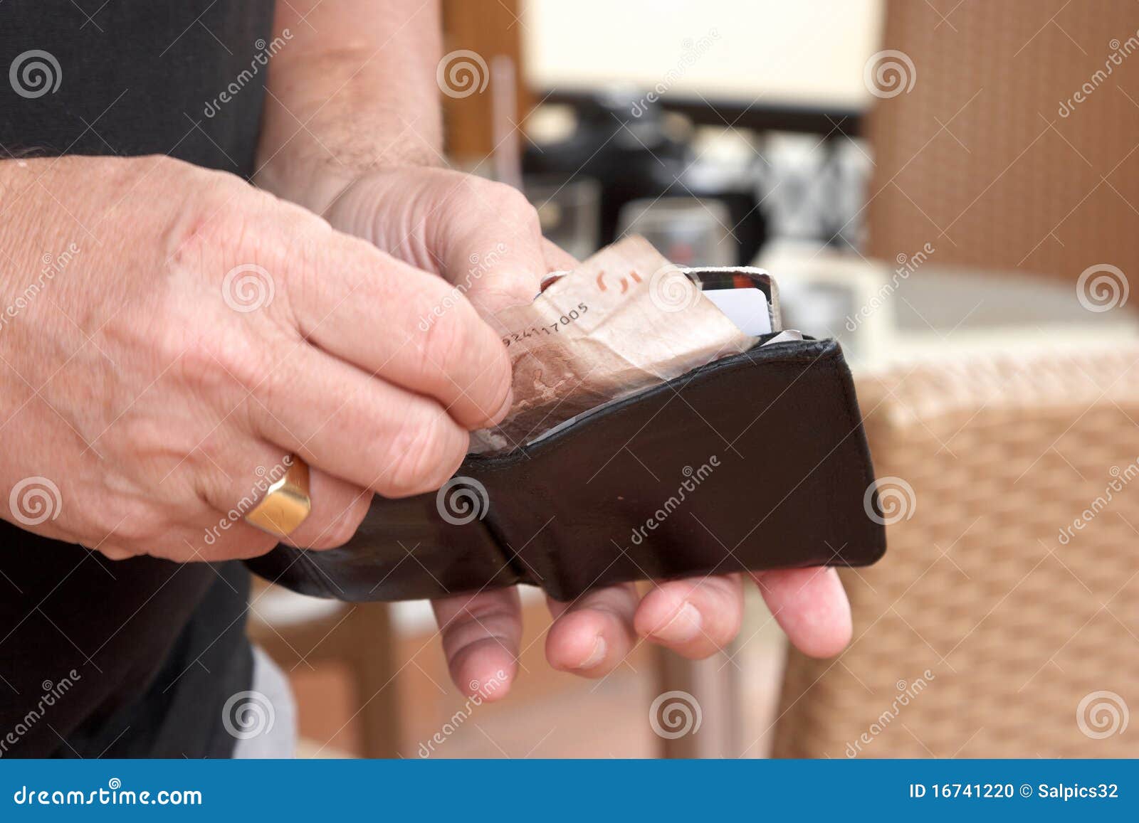 Man Taking Money Out of Wallet Stock Photo - Image of money, purchasing ...