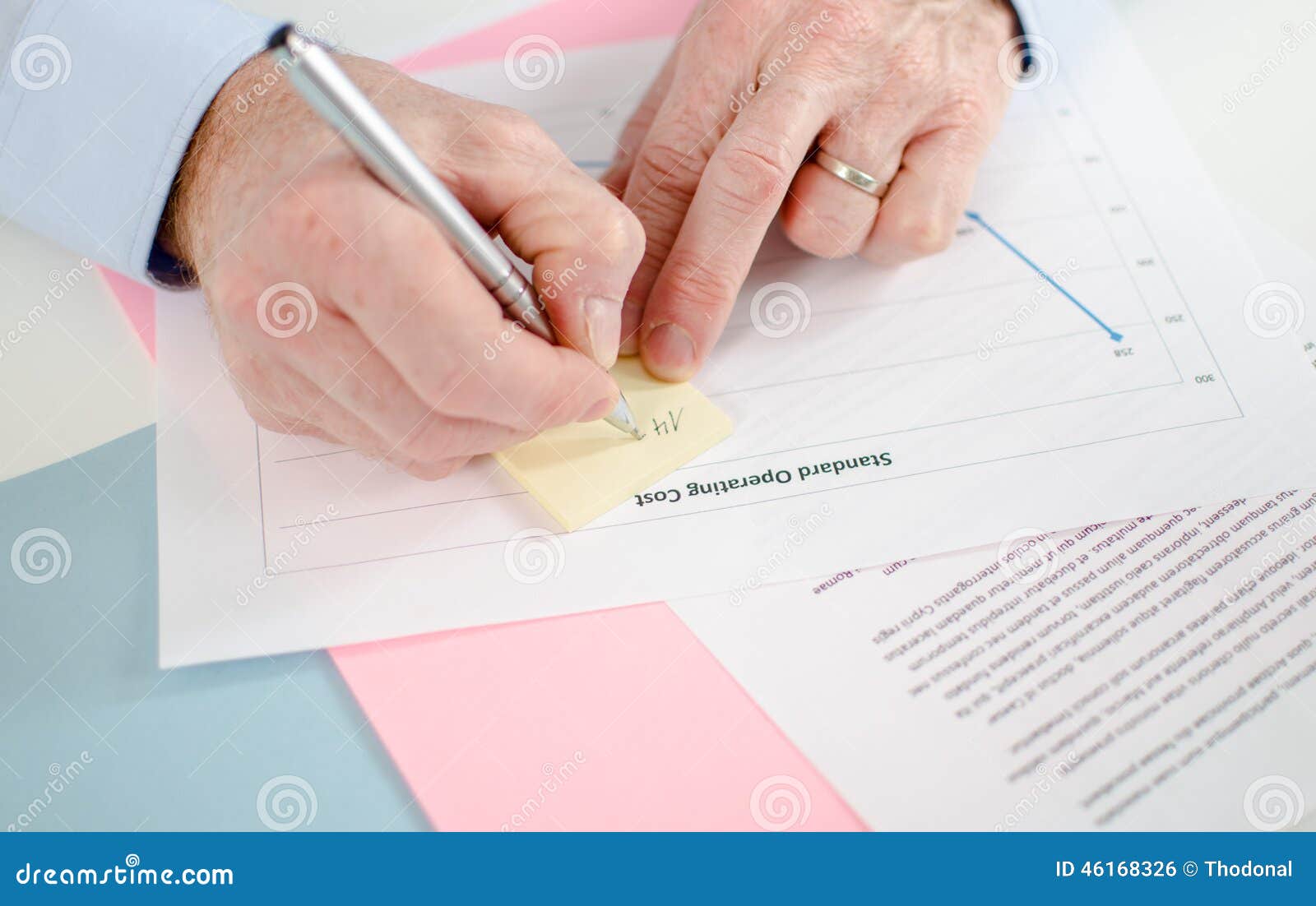 Man Taking a Note on a Post it Stock Photo - Image of message, office ...