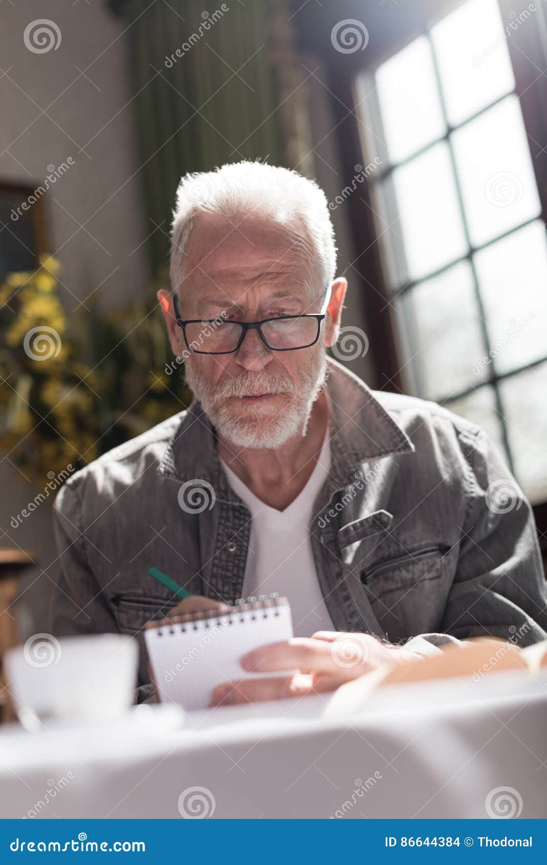 Man Taking Notes, Hard Light Effect Stock Photo - Image of taking ...