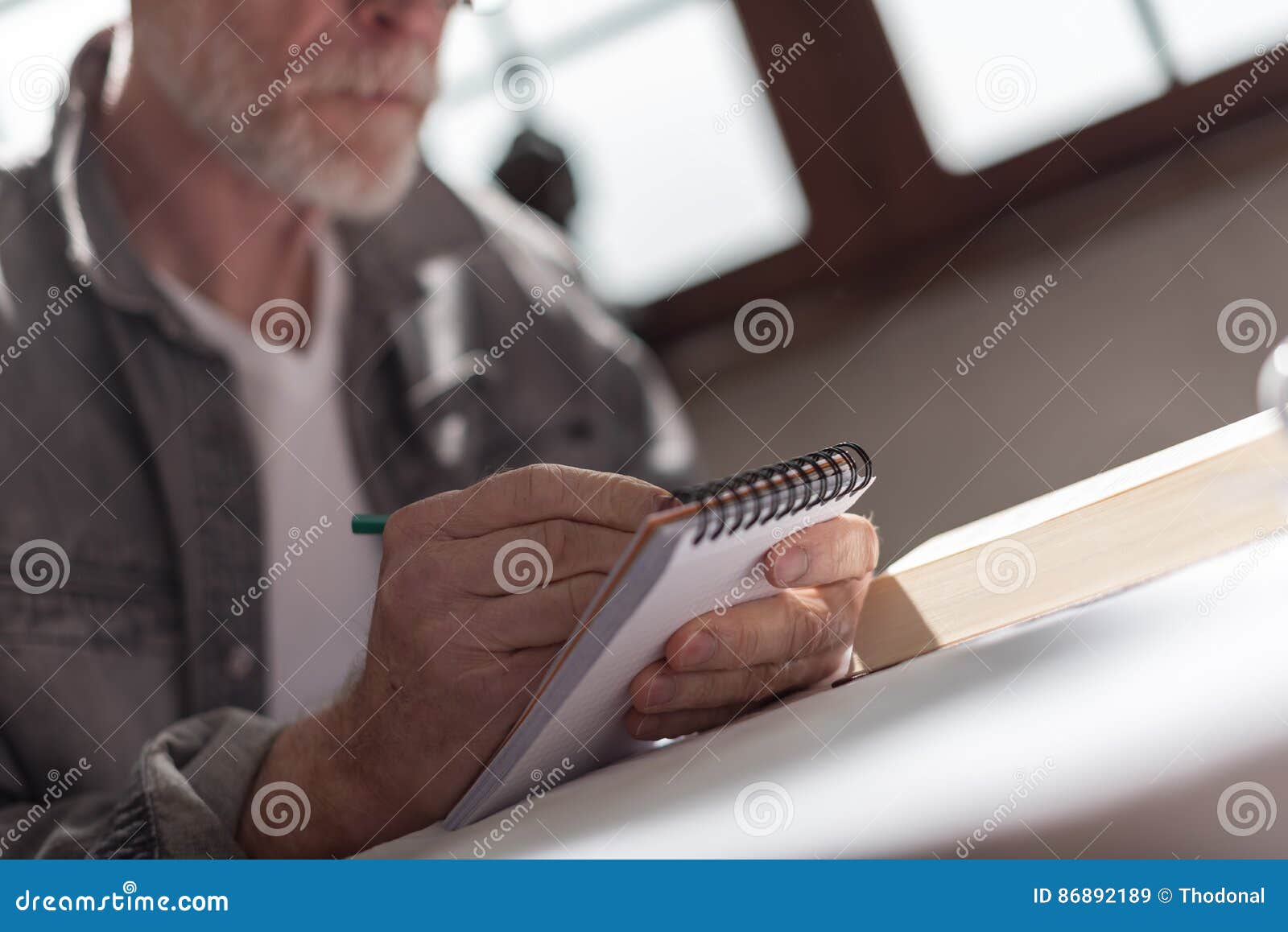 Man Taking Notes, Hard Light Effect Stock Image - Image of book, people ...