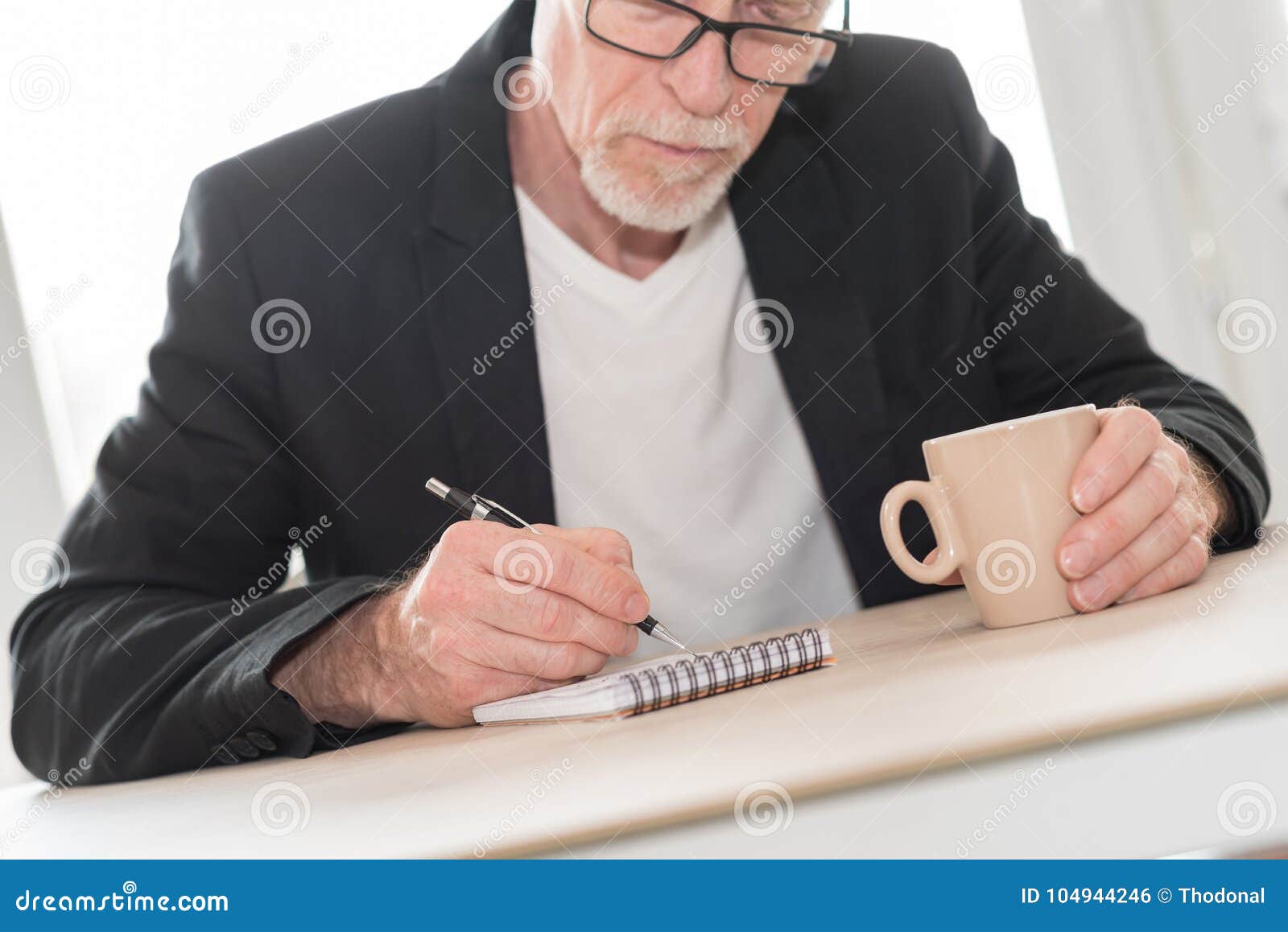 Man Taking Notes on a Notebook Stock Photo - Image of people, notebook ...
