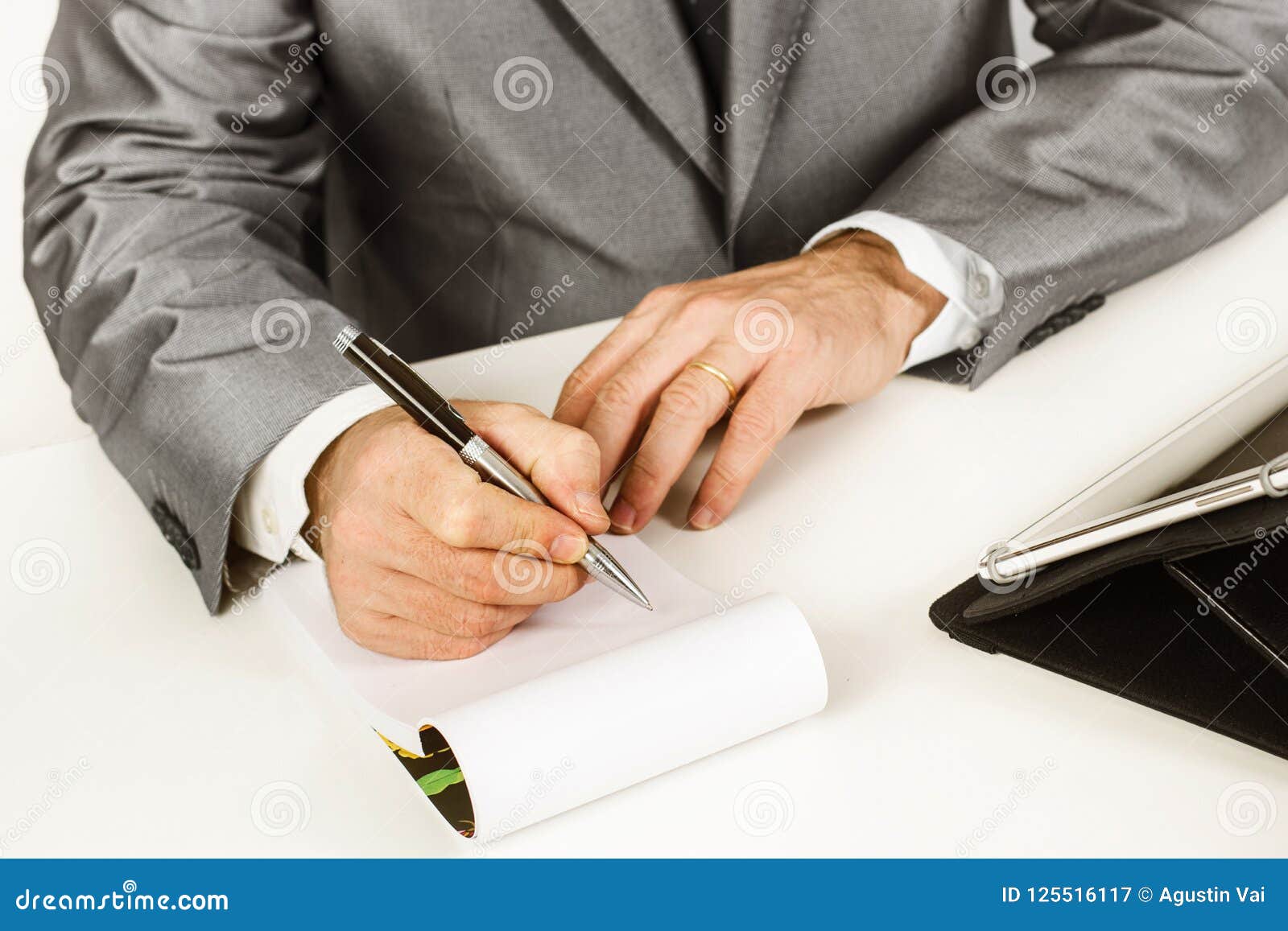 Man working with papers stock image. Image of notebook - 125516117