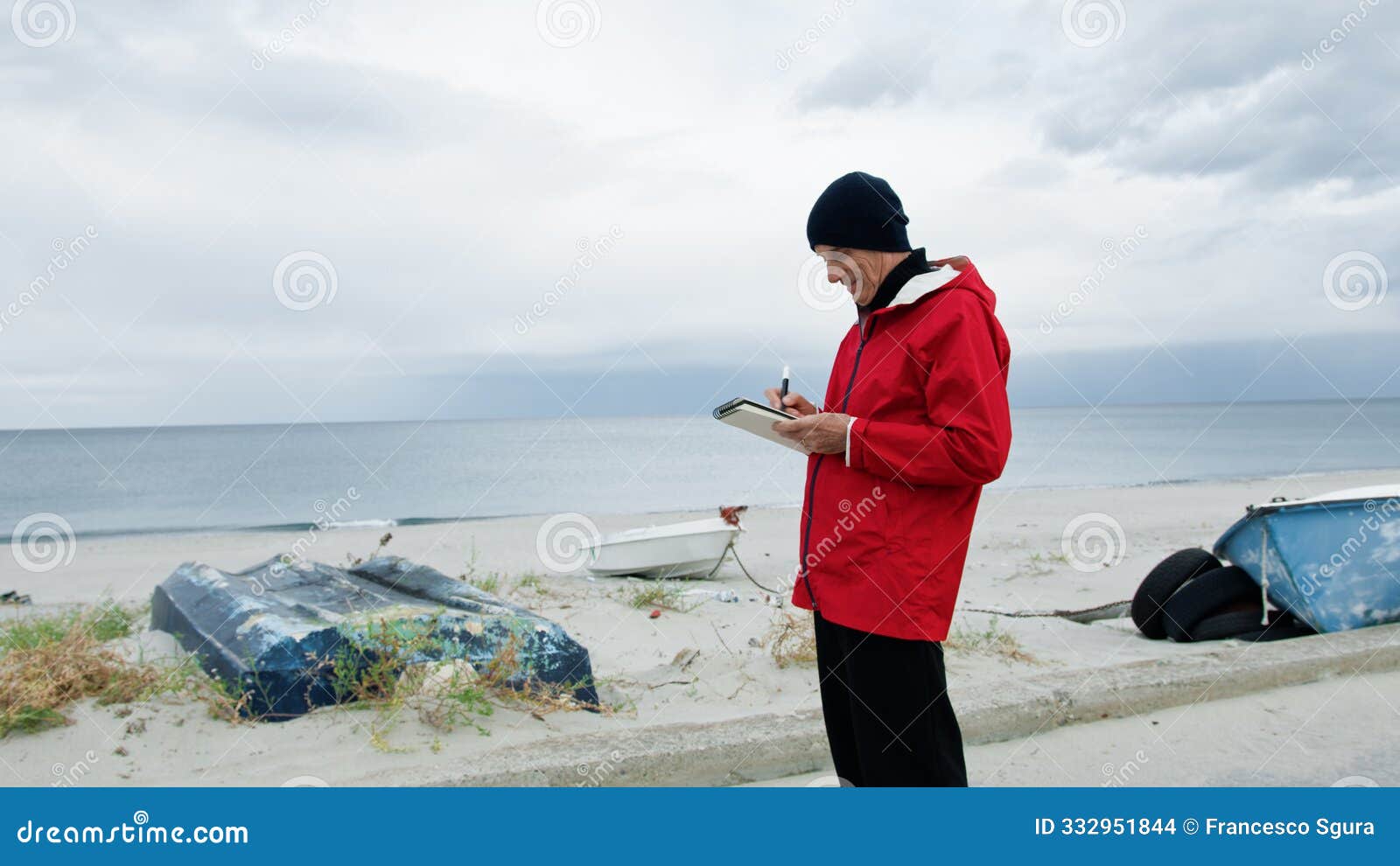 Man Taking Notes at the Sea Stock Photo - Image of water, watch: 332951844