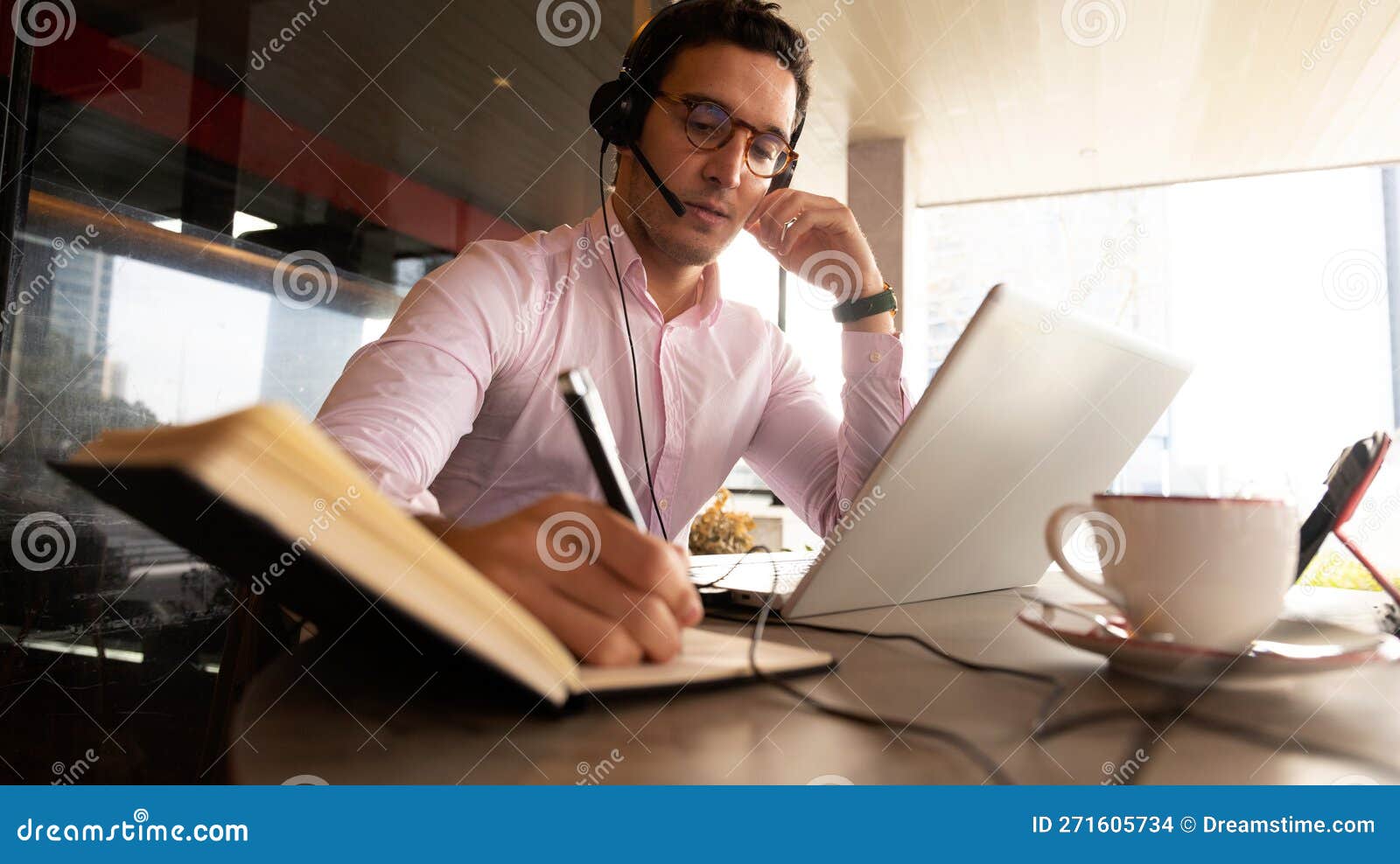 Man Taking Notes on a Terrace while Teleworking Stock Photo - Image of ...