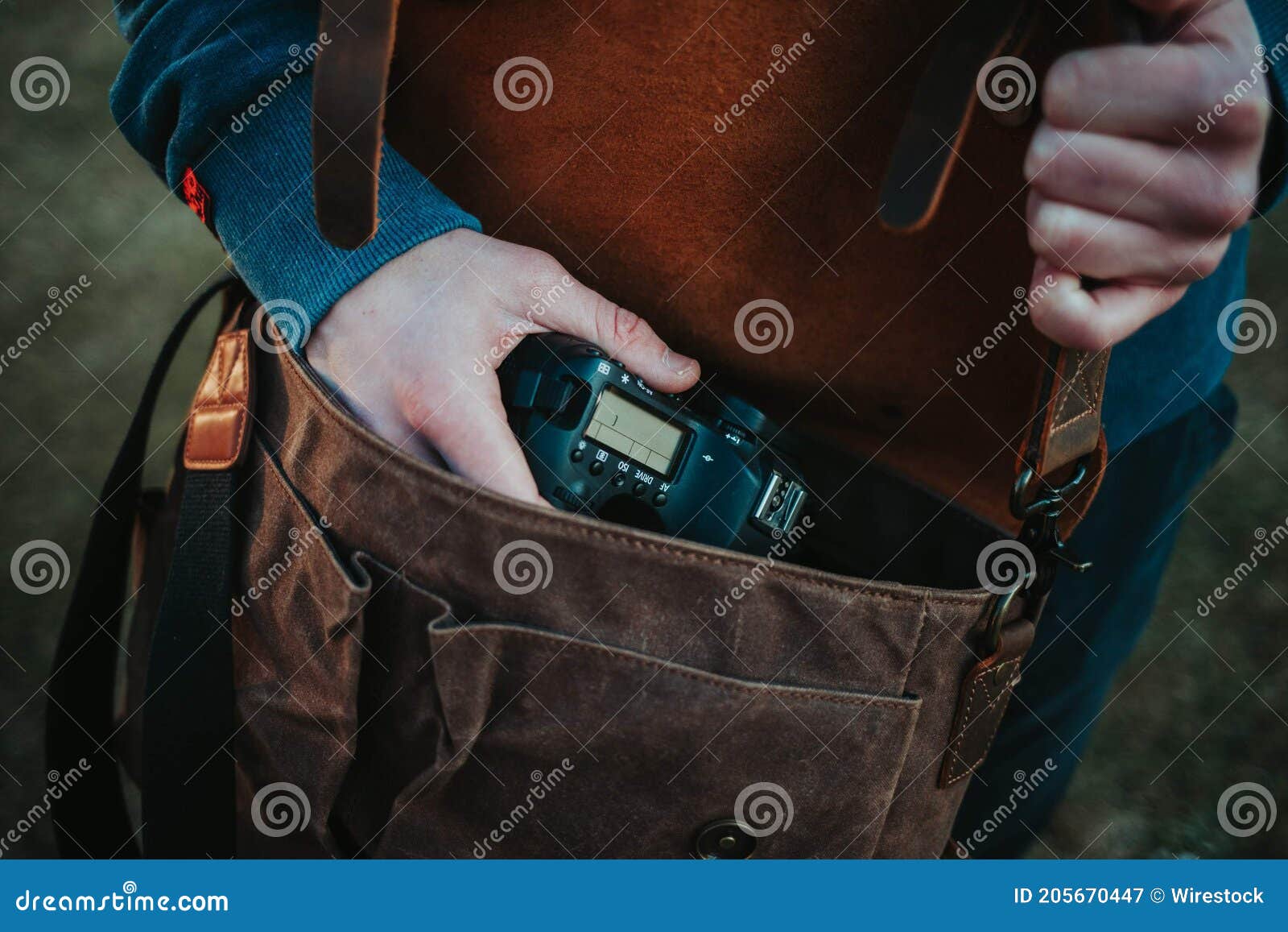 Man Taking Out His Camera Out of the Bag Stock Image - Image of camera ...