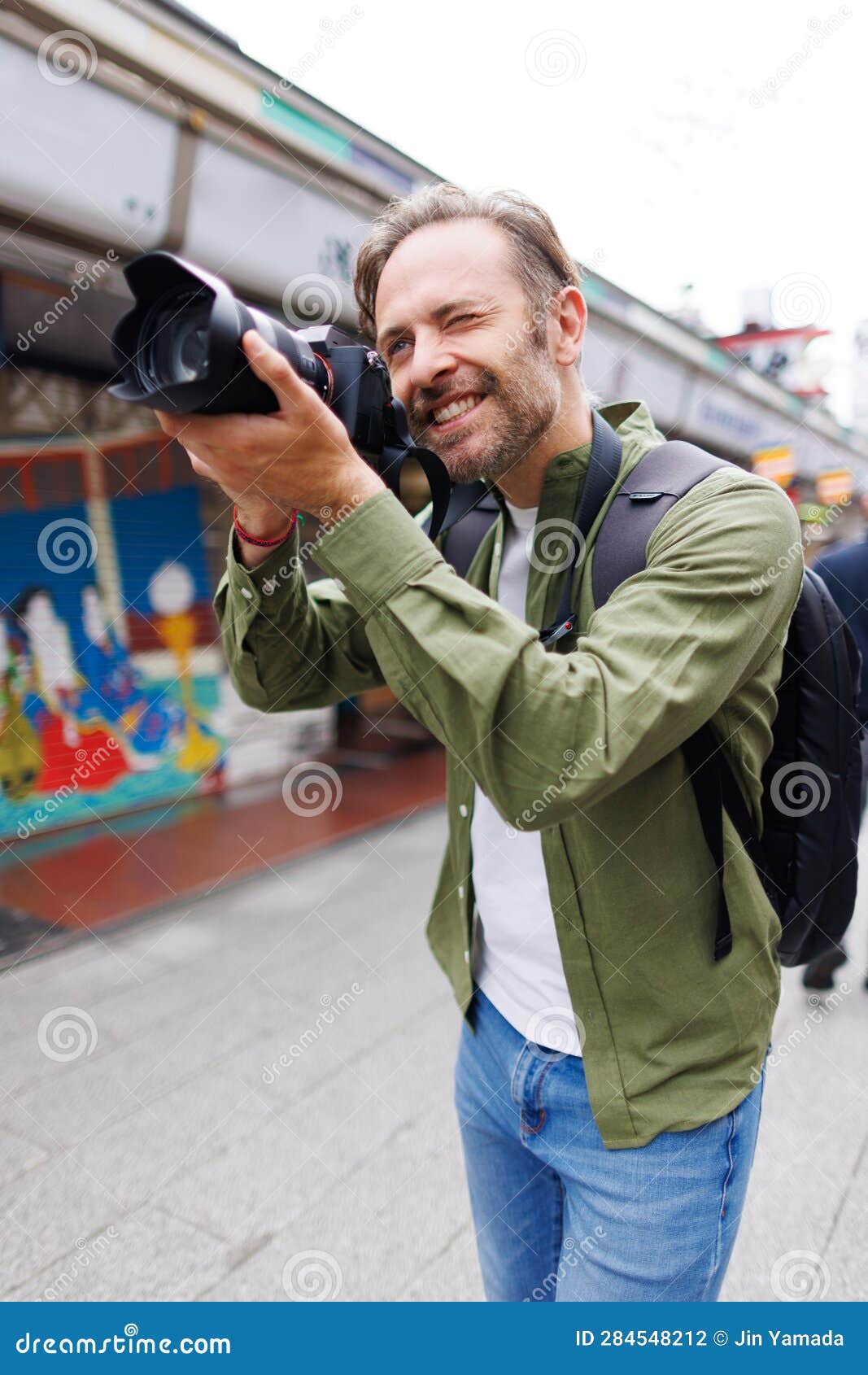 Man taking a picture stock photo. Image of photographer - 284548212