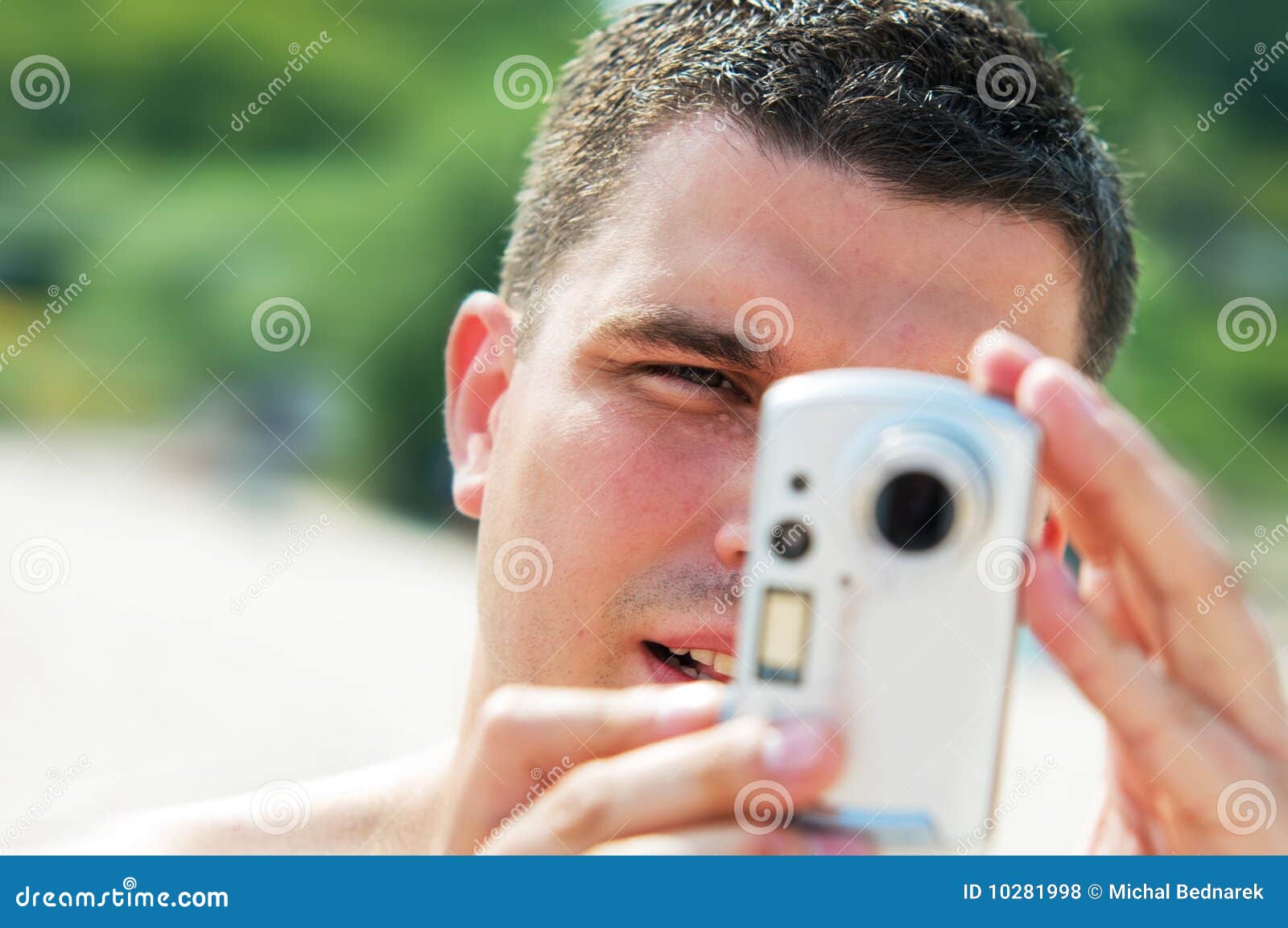 Man Taking Picture on Holidays Stock Photo - Image of hand, holding ...