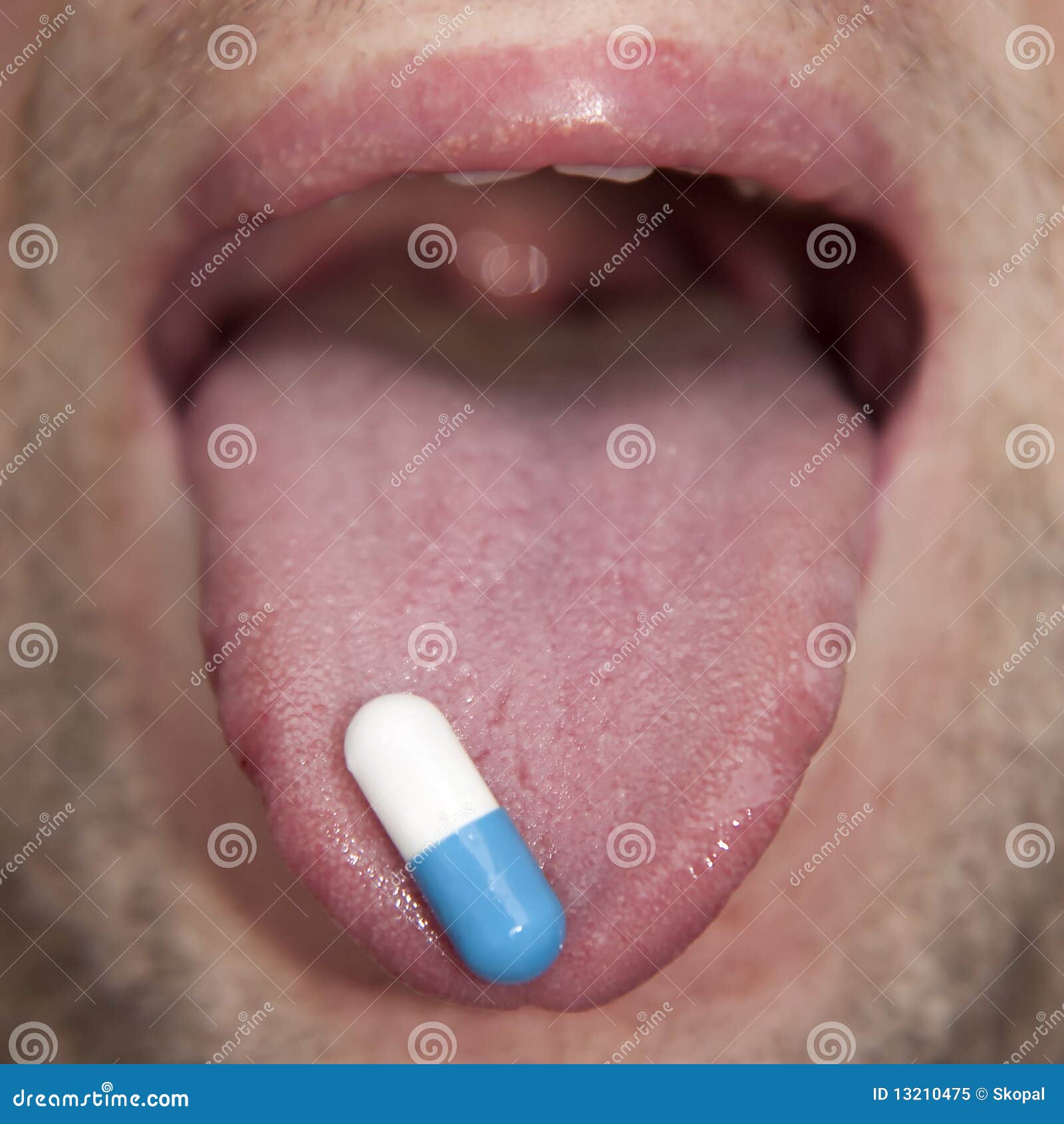 Man taking a pill stock image. Image of pill, capsule - 13210475