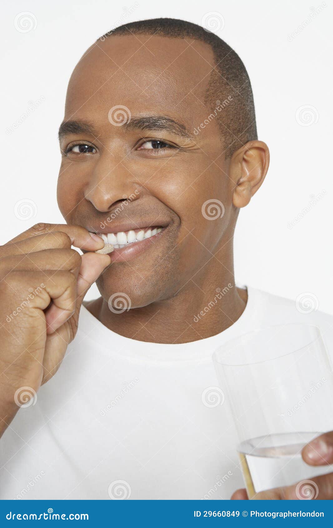 Man Taking Pill stock image. Image of treatment, happy - 29660849